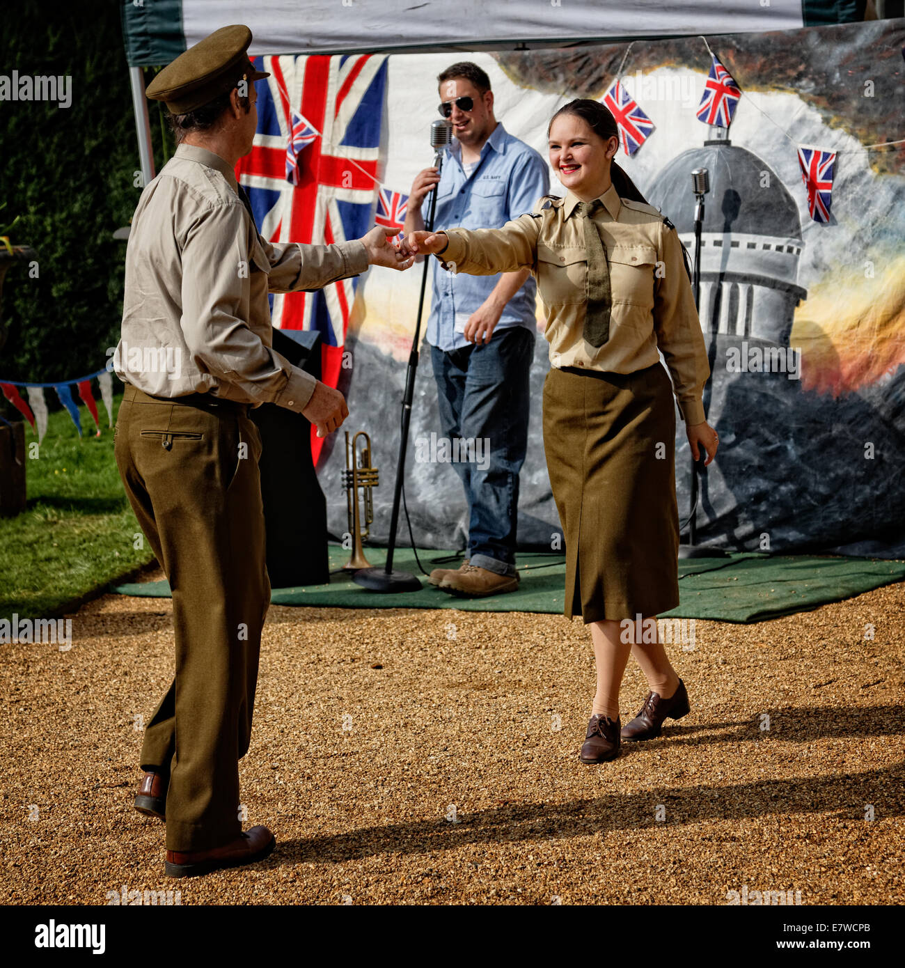 Ricky Hunter 1940s vocalist sings while members of ENSA (Entertainment ...