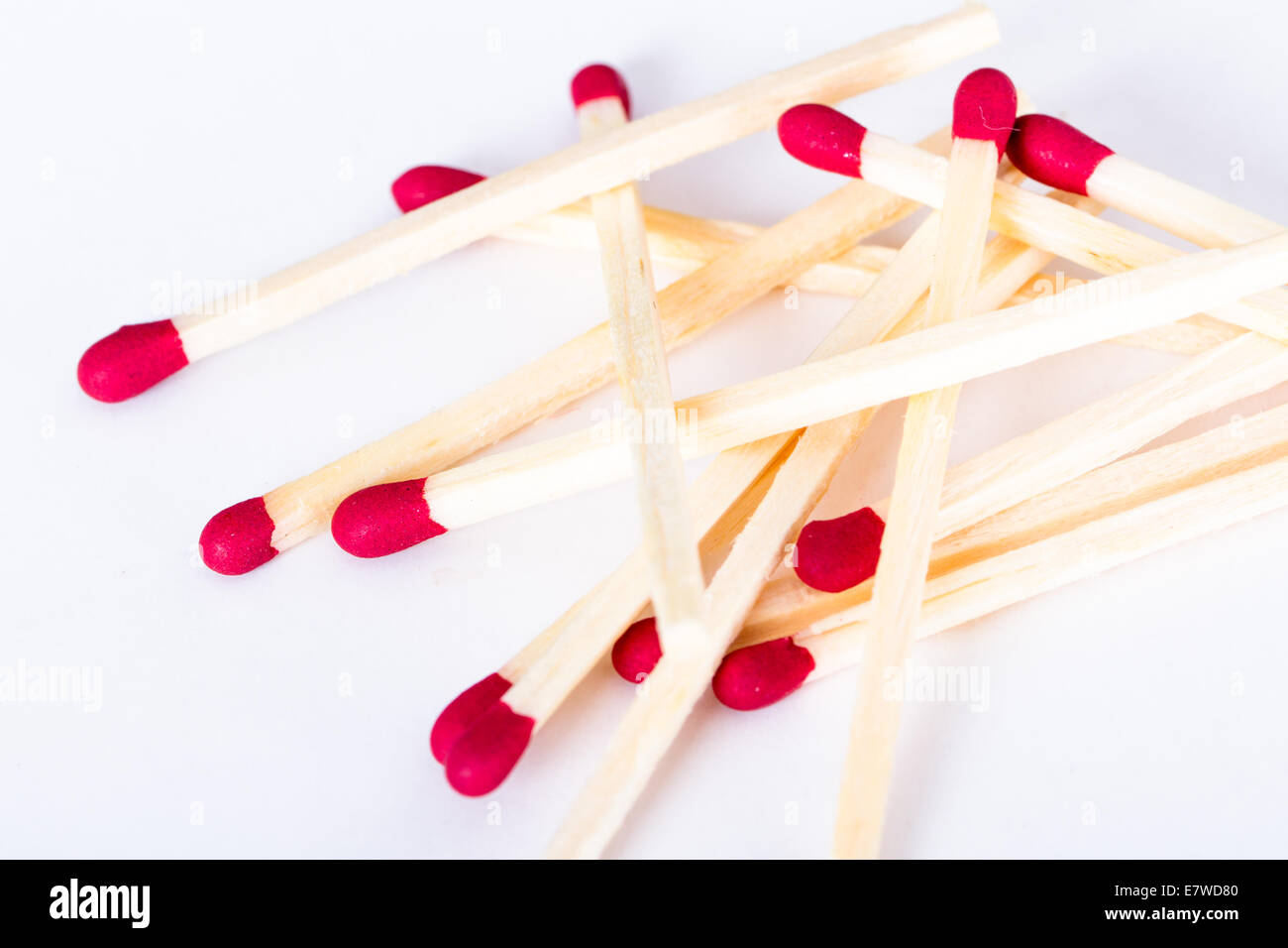Heap of red headed matches, isolated on white background Stock Photo ...