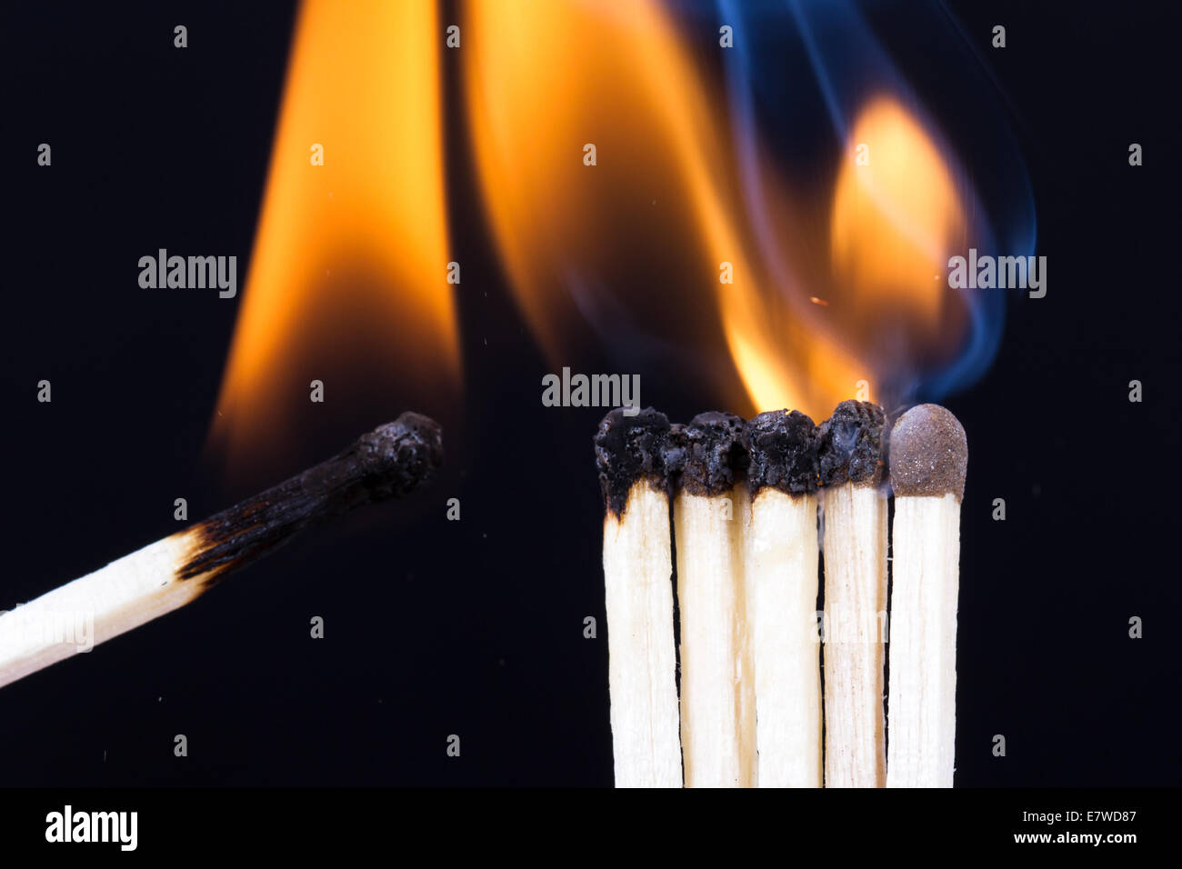 Ideas and inspiration concept, burning match with flame setting fire to ...