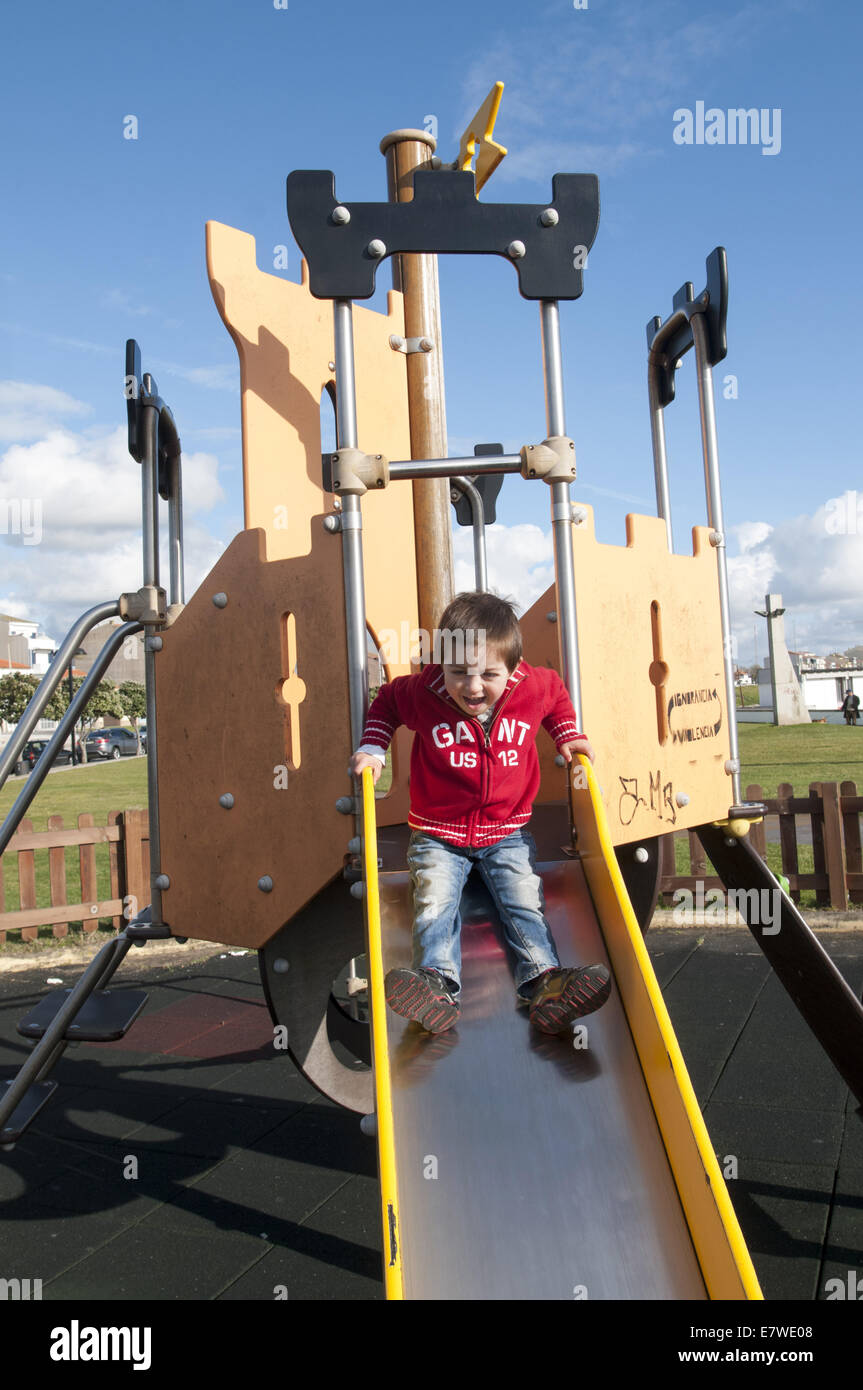 Toddler playing on the playground Stock Photo - Alamy