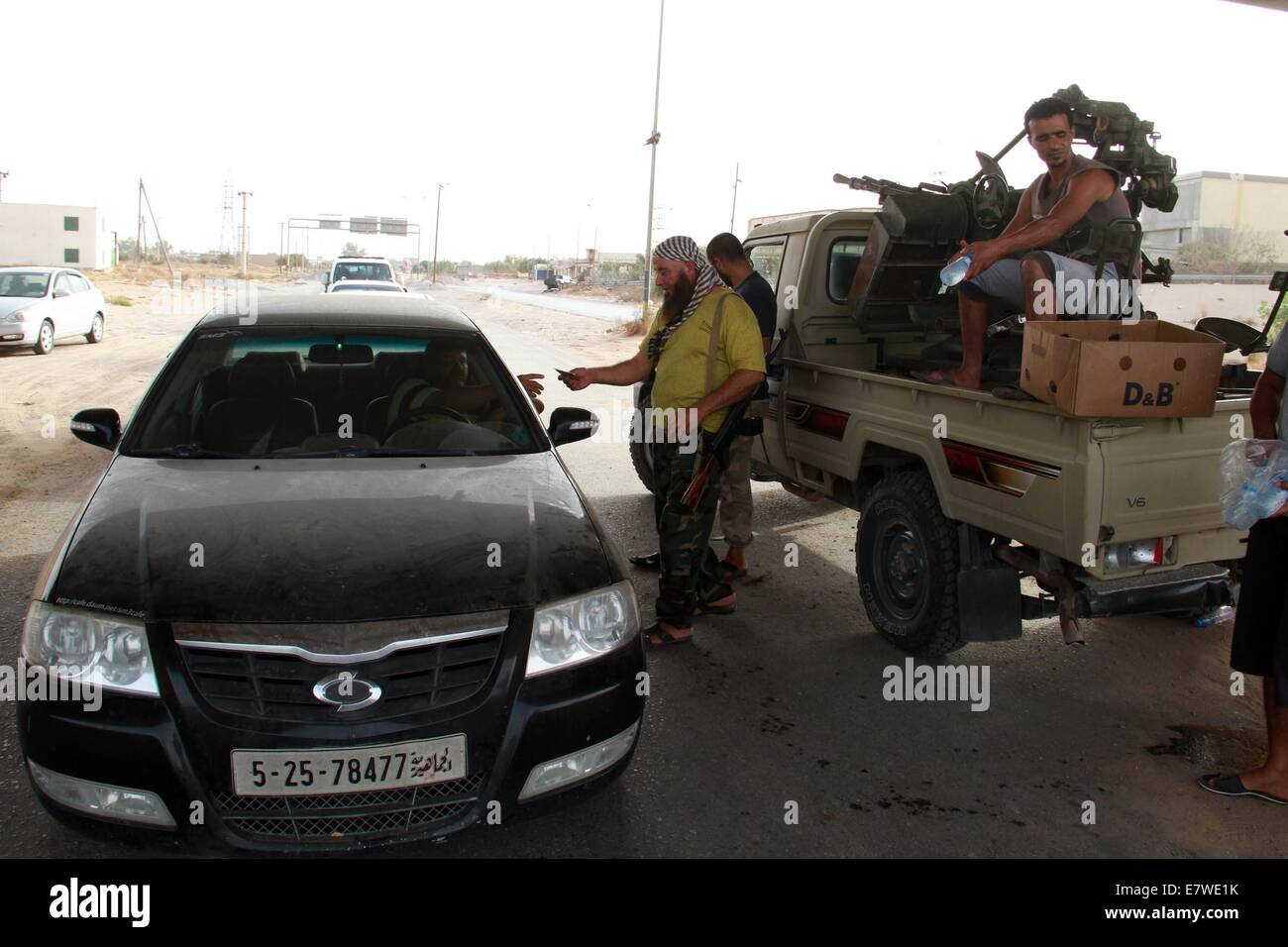 Tripoli, Libya. 24th Sep, 2014. Some Libya Dawn fighters check cars ...