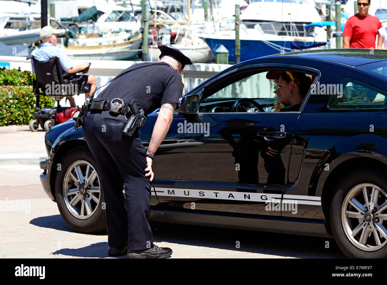 Policeman talking with a driver about a traffic violation Stock Photo ...