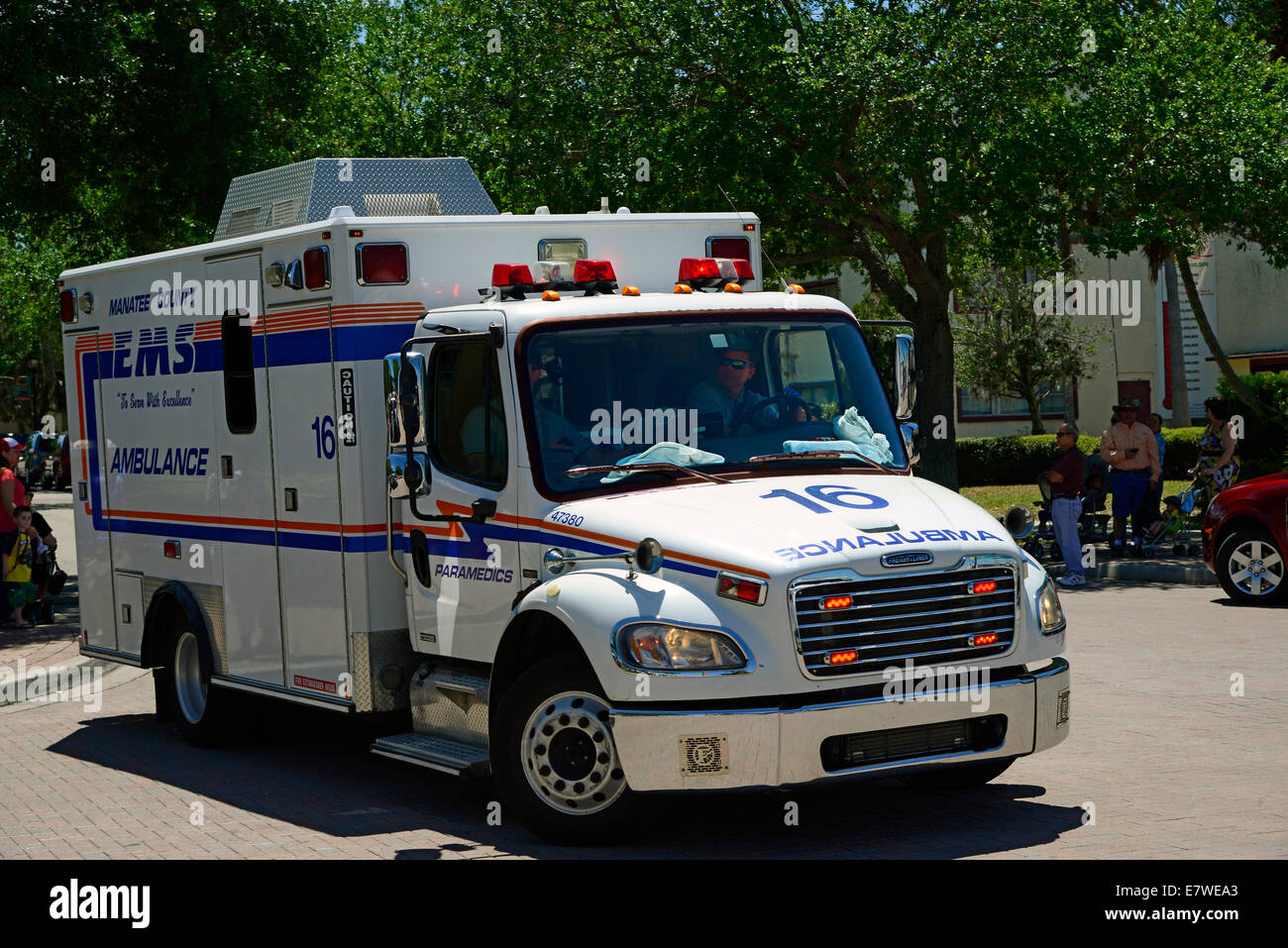 Ambulance attends to an emergency Stock Photo - Alamy
