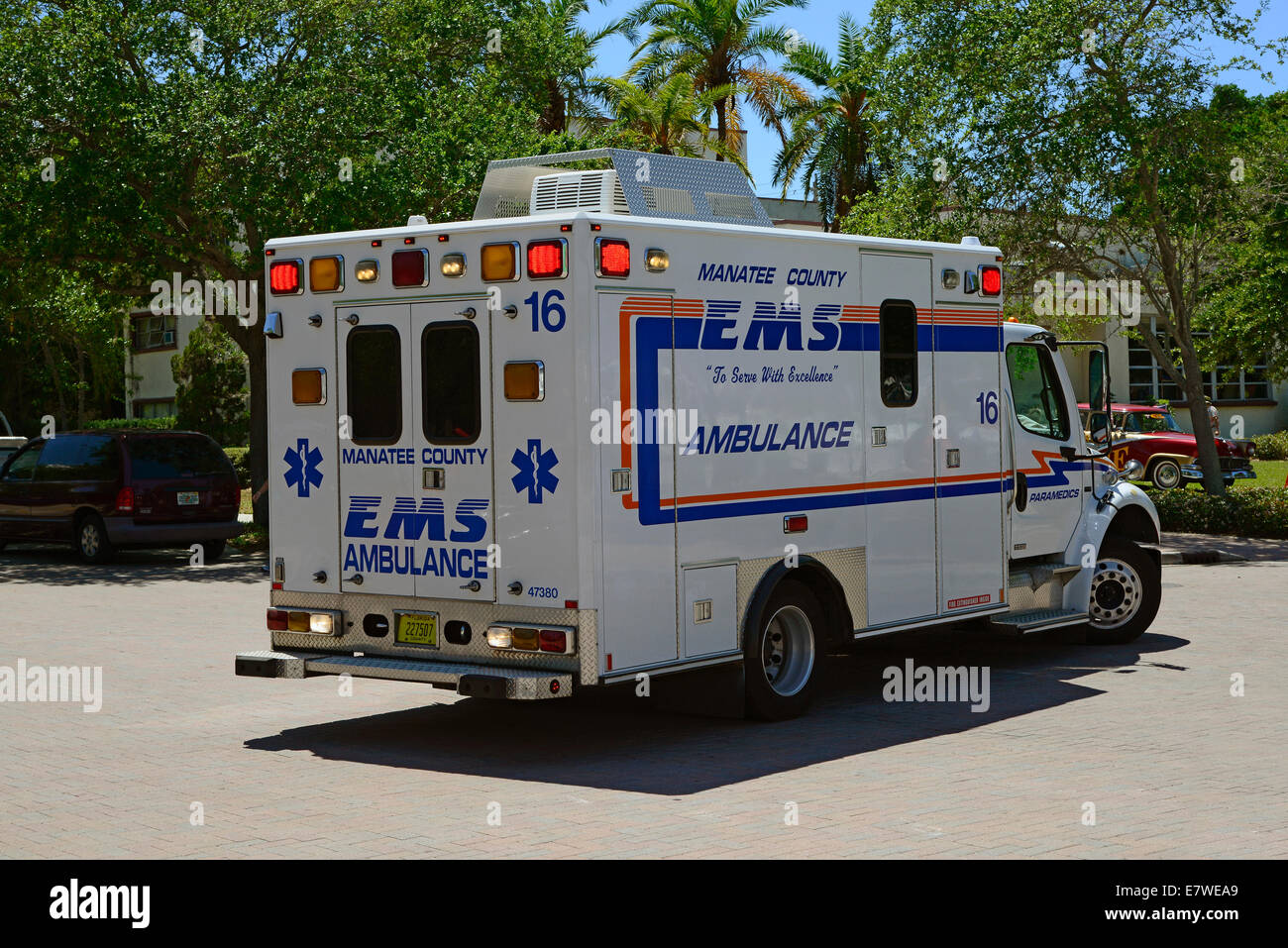 Ambulance attends to an emergency Stock Photo - Alamy