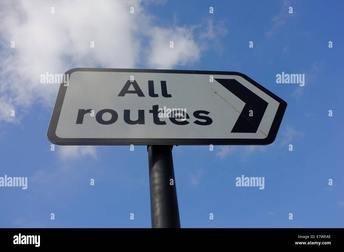All routes sign indicating direction of travel on a post in England ...