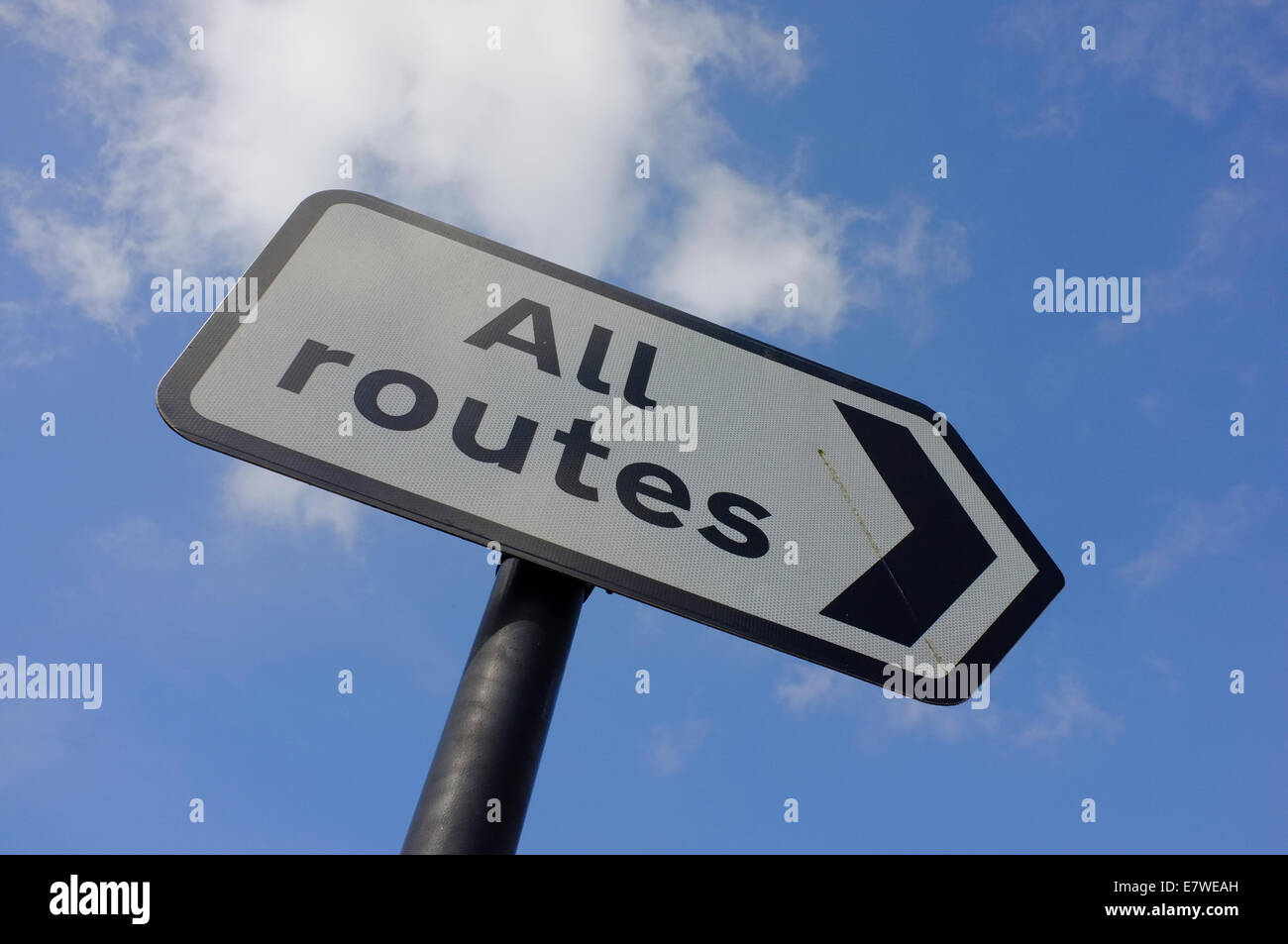 All routes sign indicating direction of travel on a post in England ...