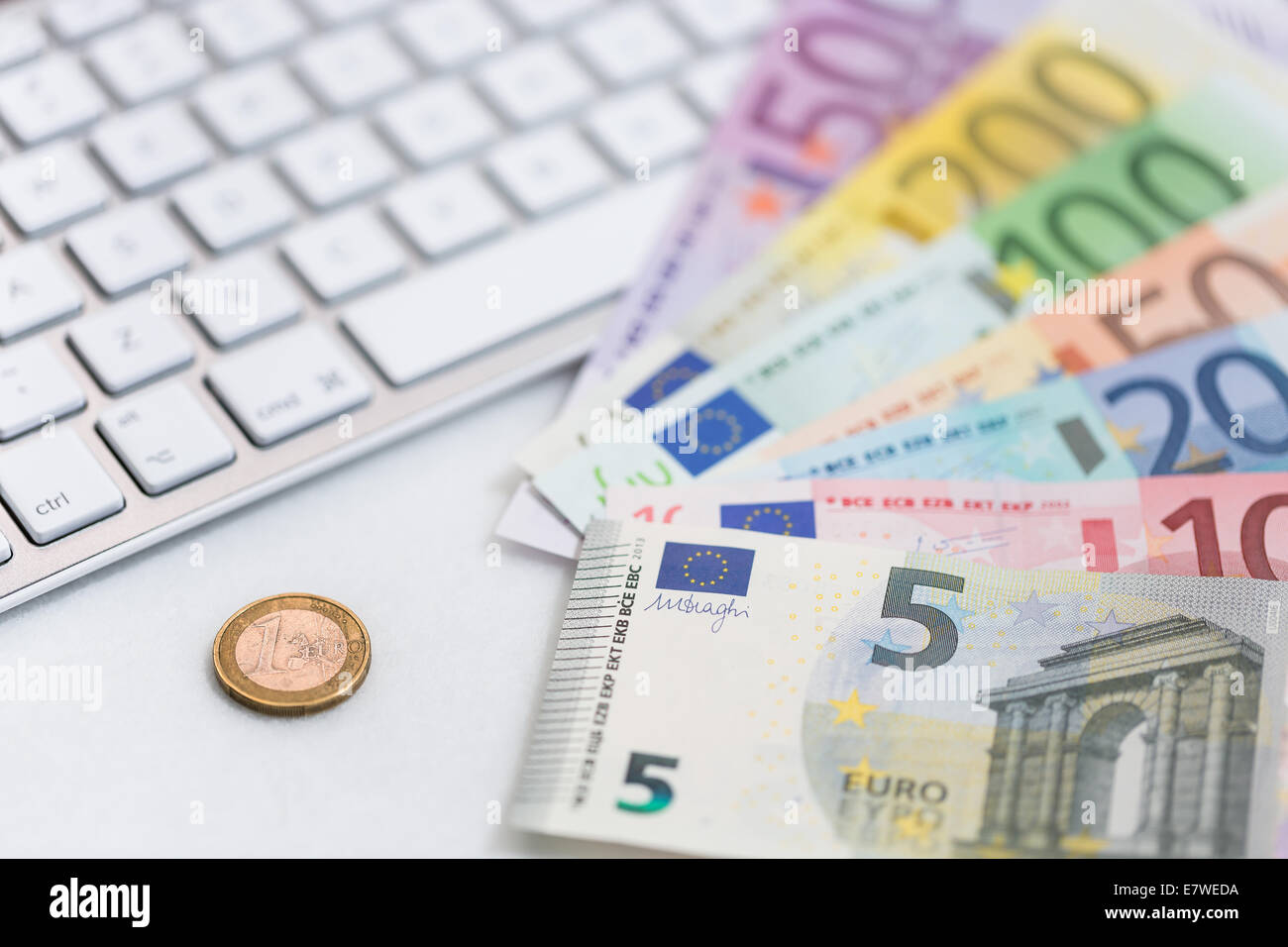 Computer piracy and EUR money Stock Photo - Alamy