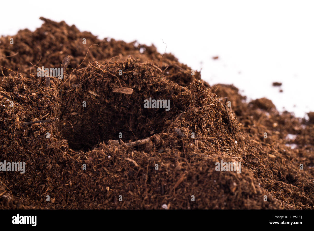 Close up view of pile of soil, isolated on white background Stock Photo ...