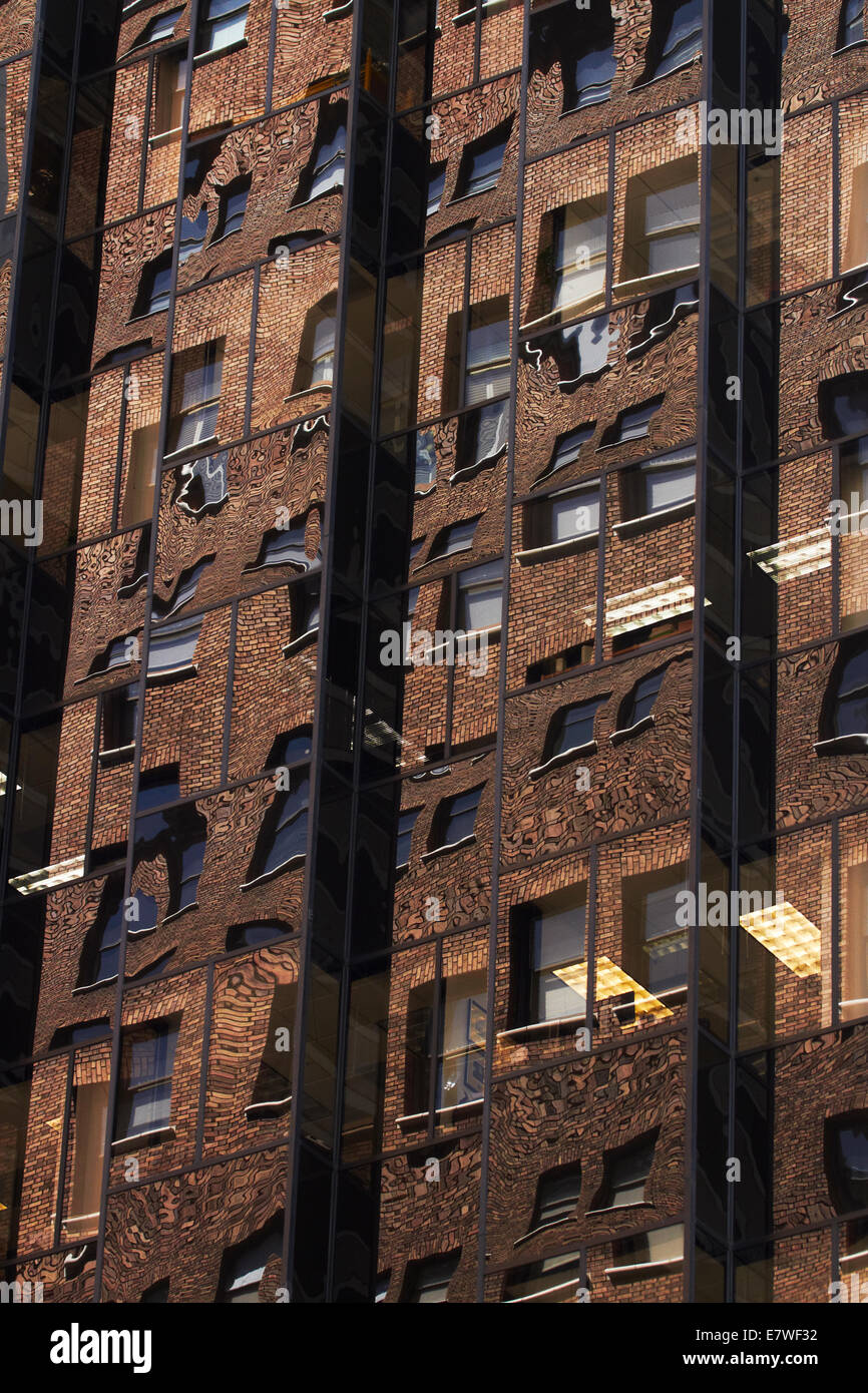 JH Dollar Building reflected in facade of office building at 425 ...