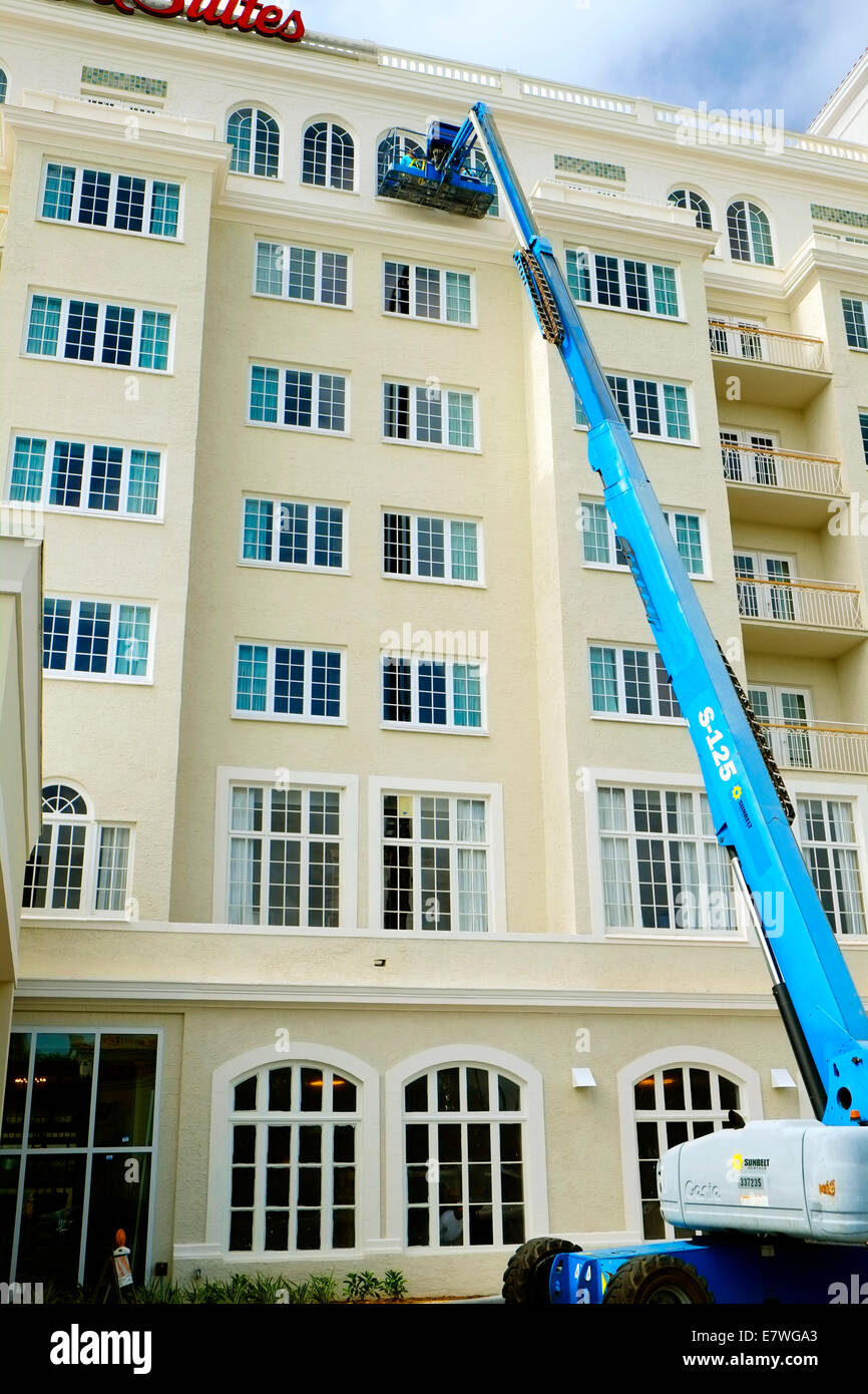 Window washing a seven story tall building Stock Photo - Alamy