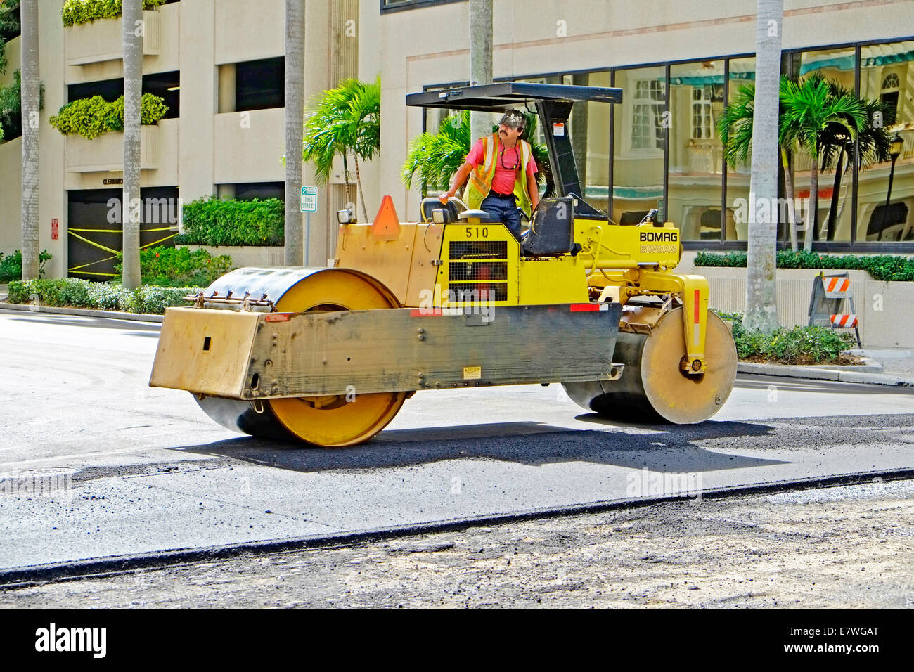Asphalt paving of a street using heavy equipment Stock Photo - Alamy