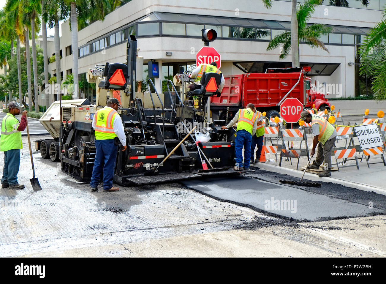 Asphalt paving of a street using heavy equipment Stock Photo - Alamy