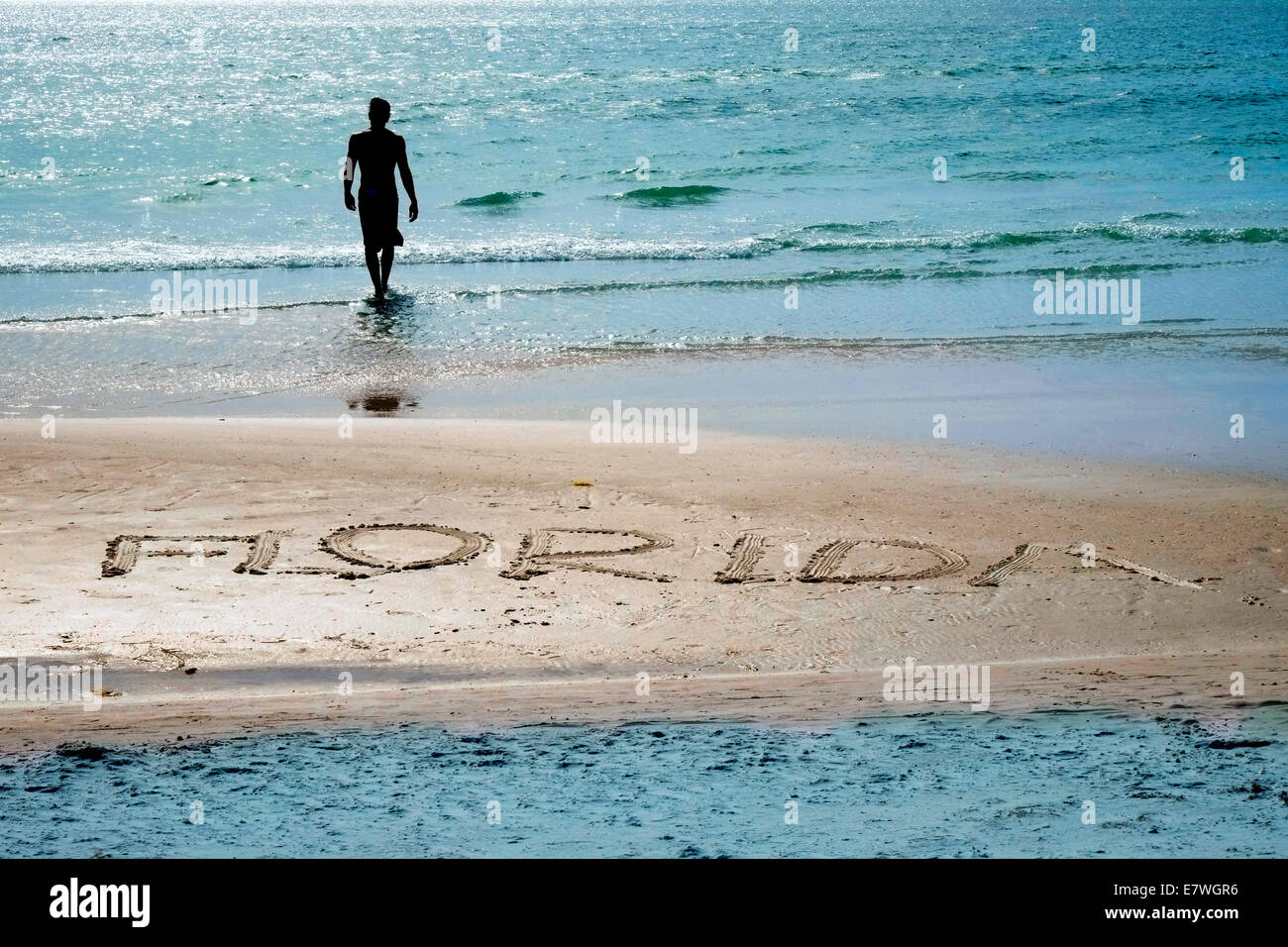 The word Florida written in the sand at Siesta Beach Sarasota Florida ...