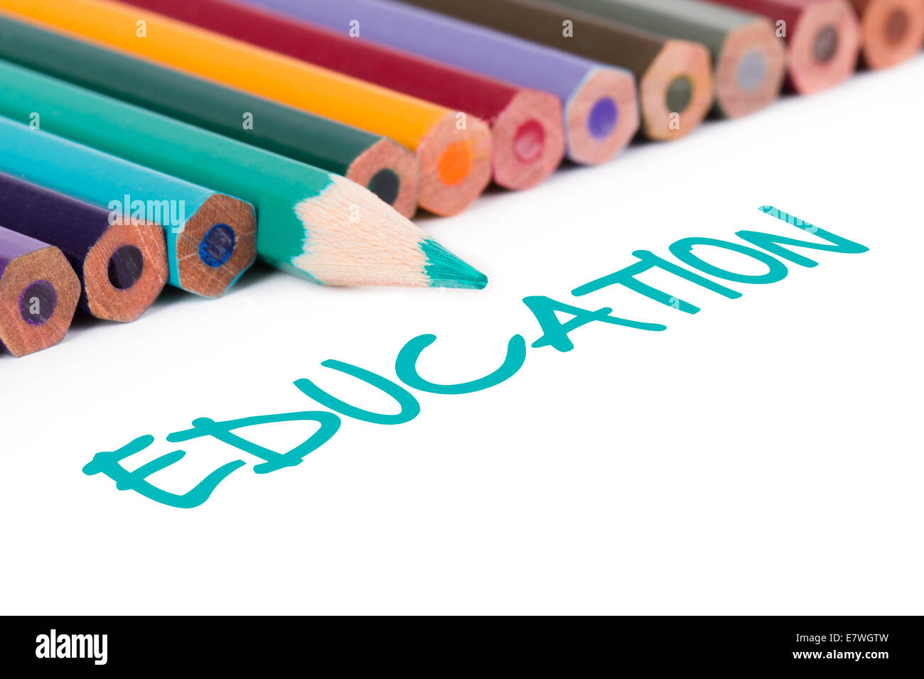 Colorful pencils with education text, isolated on white background ...