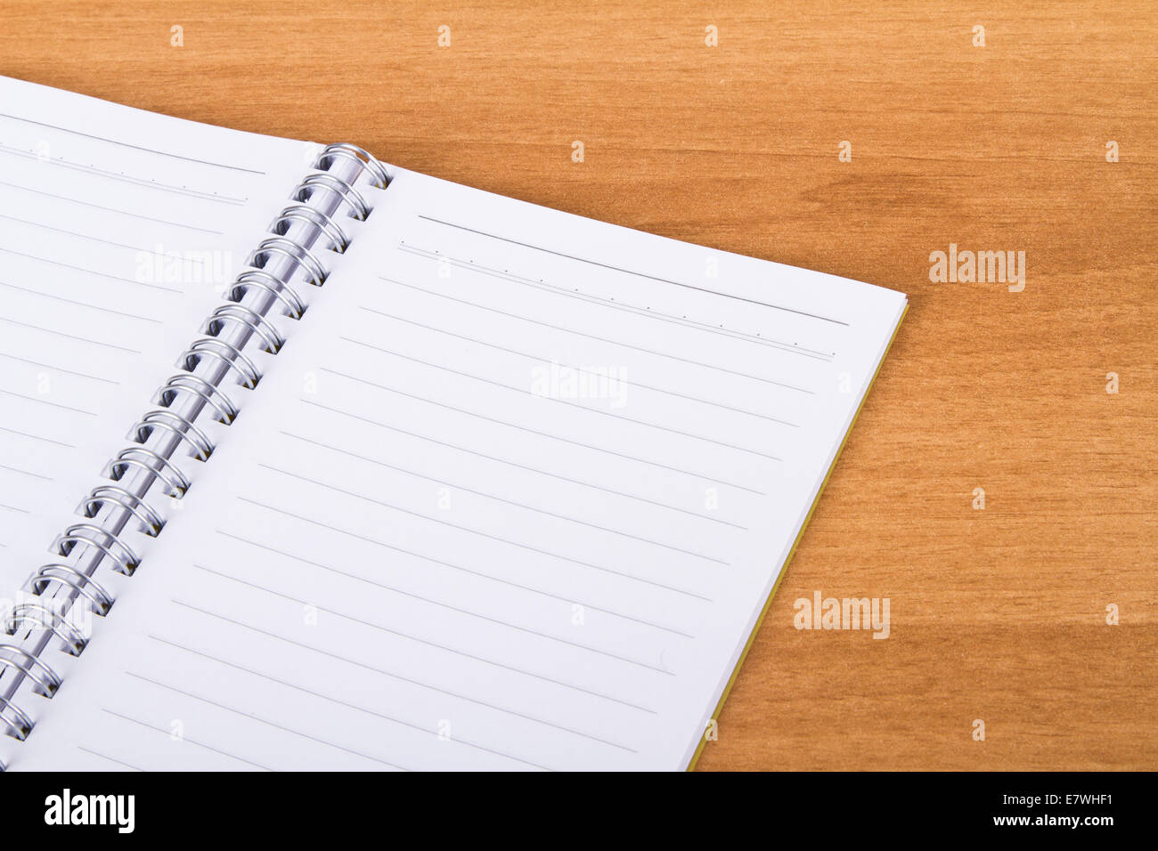 Blank, white, open notebook on wood background Stock Photo - Alamy