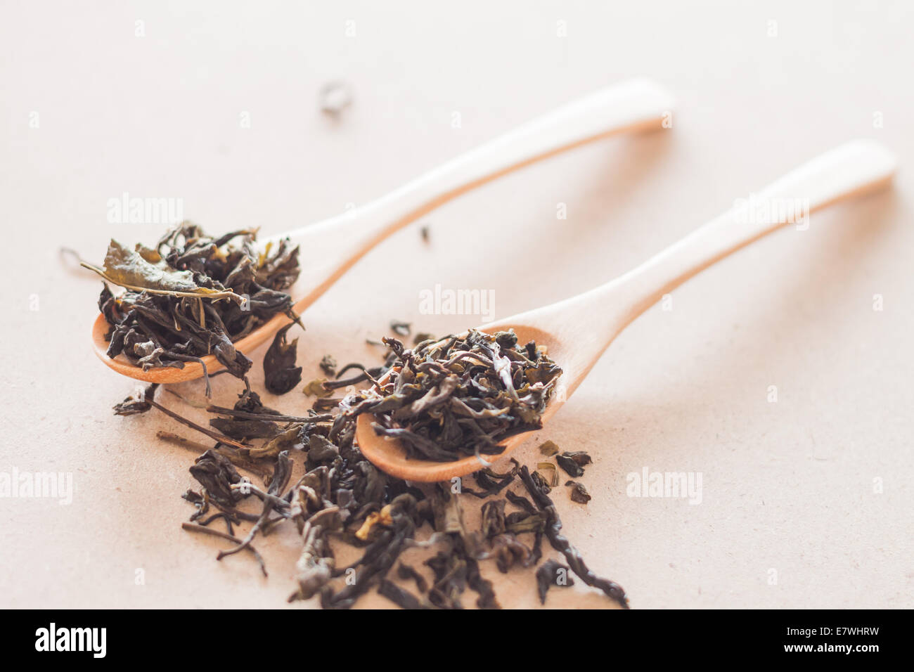 Dry tea in wooden spoons, stock photo Stock Photo - Alamy