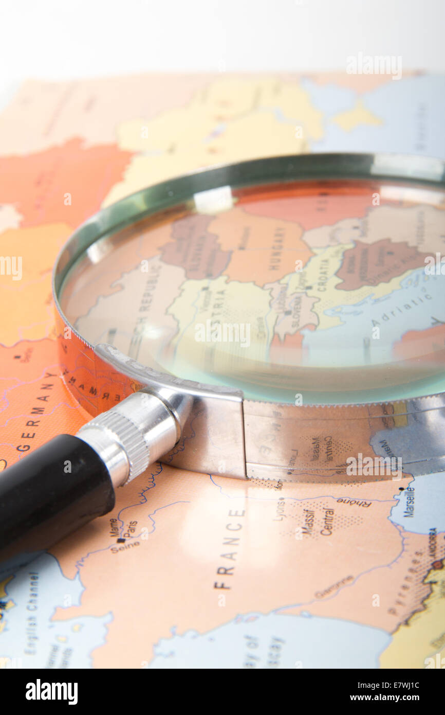 Classic style magnifying glass on map of Europe, isolated on white ...