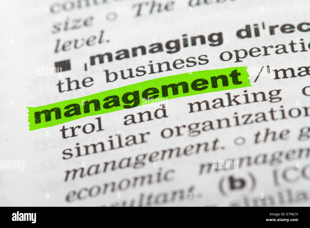 Management word highlighted with green marker on dictionary page Stock ...