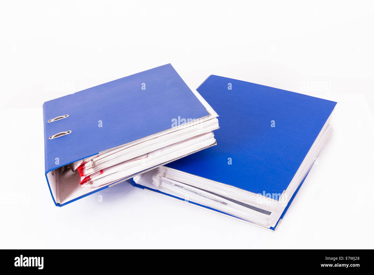 Stack of blue office folders, isolated on white background Stock Photo ...