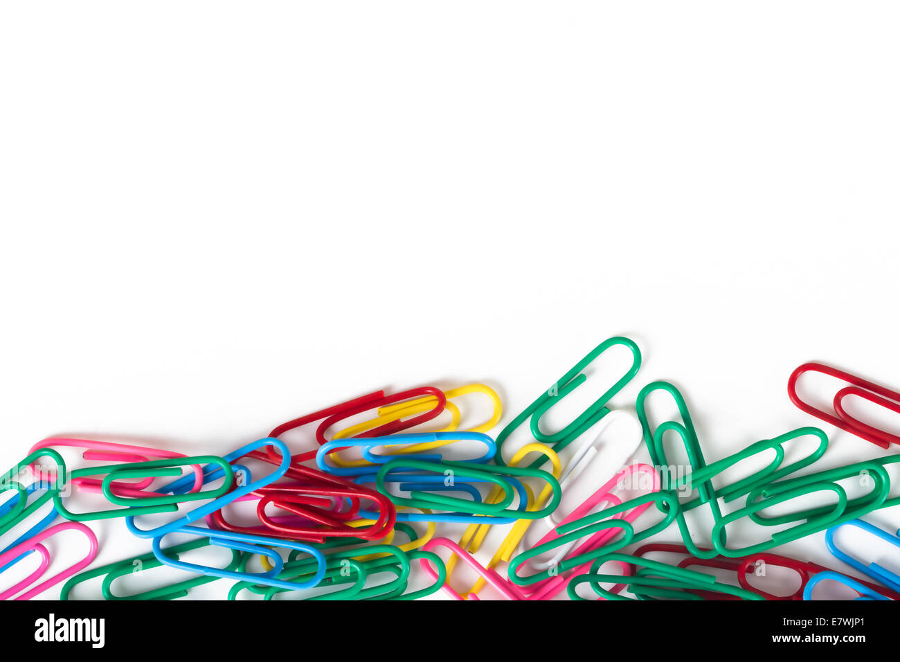 Multi colored paper clips with space, isolated on white background ...