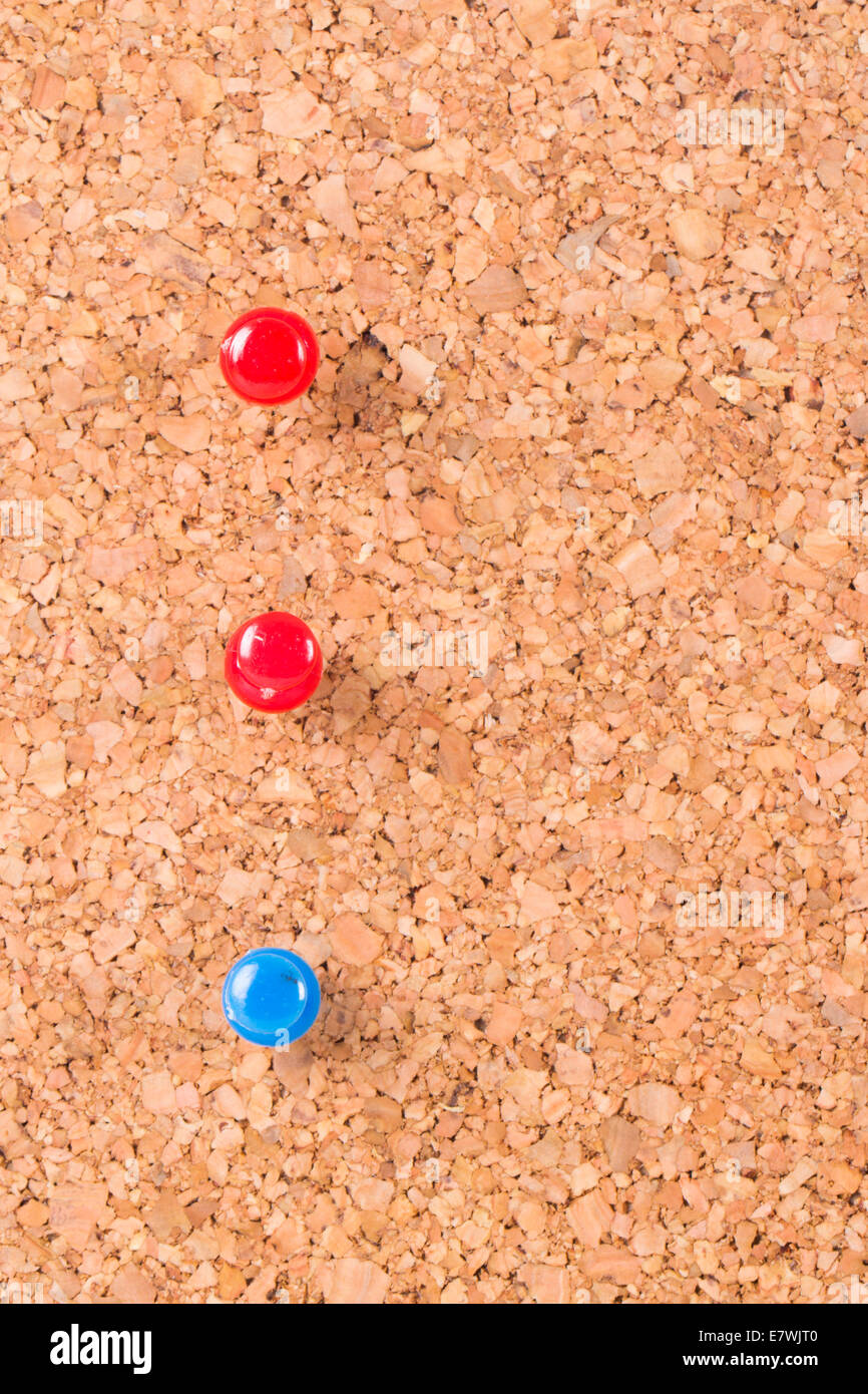 Pins on cork bulletin board Stock Photo - Alamy