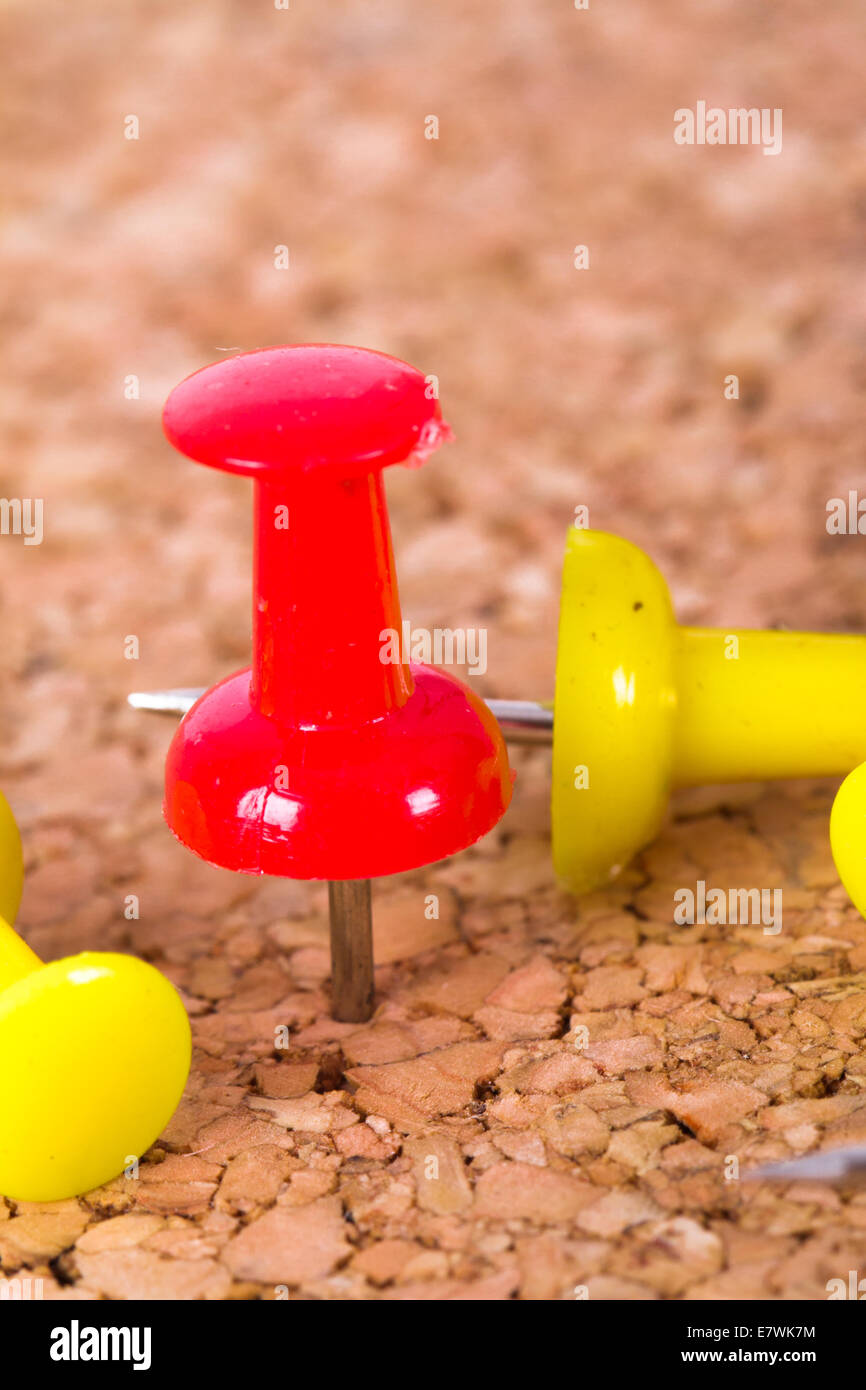 Red push pin standing out on cork bulletin board Stock Photo - Alamy