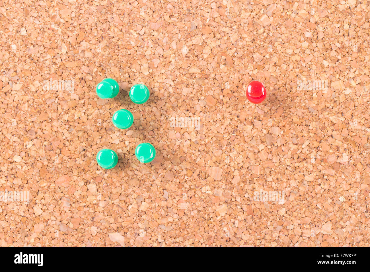 Red push pin standing out on cork bulletin board Stock Photo - Alamy