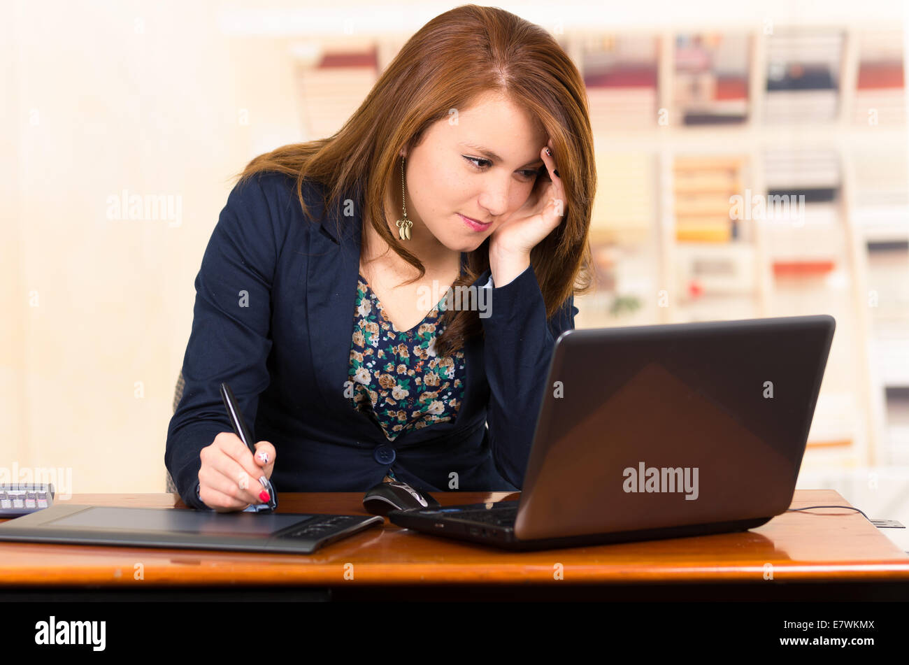 secretary working with laptop and tablet Stock Photo - Alamy