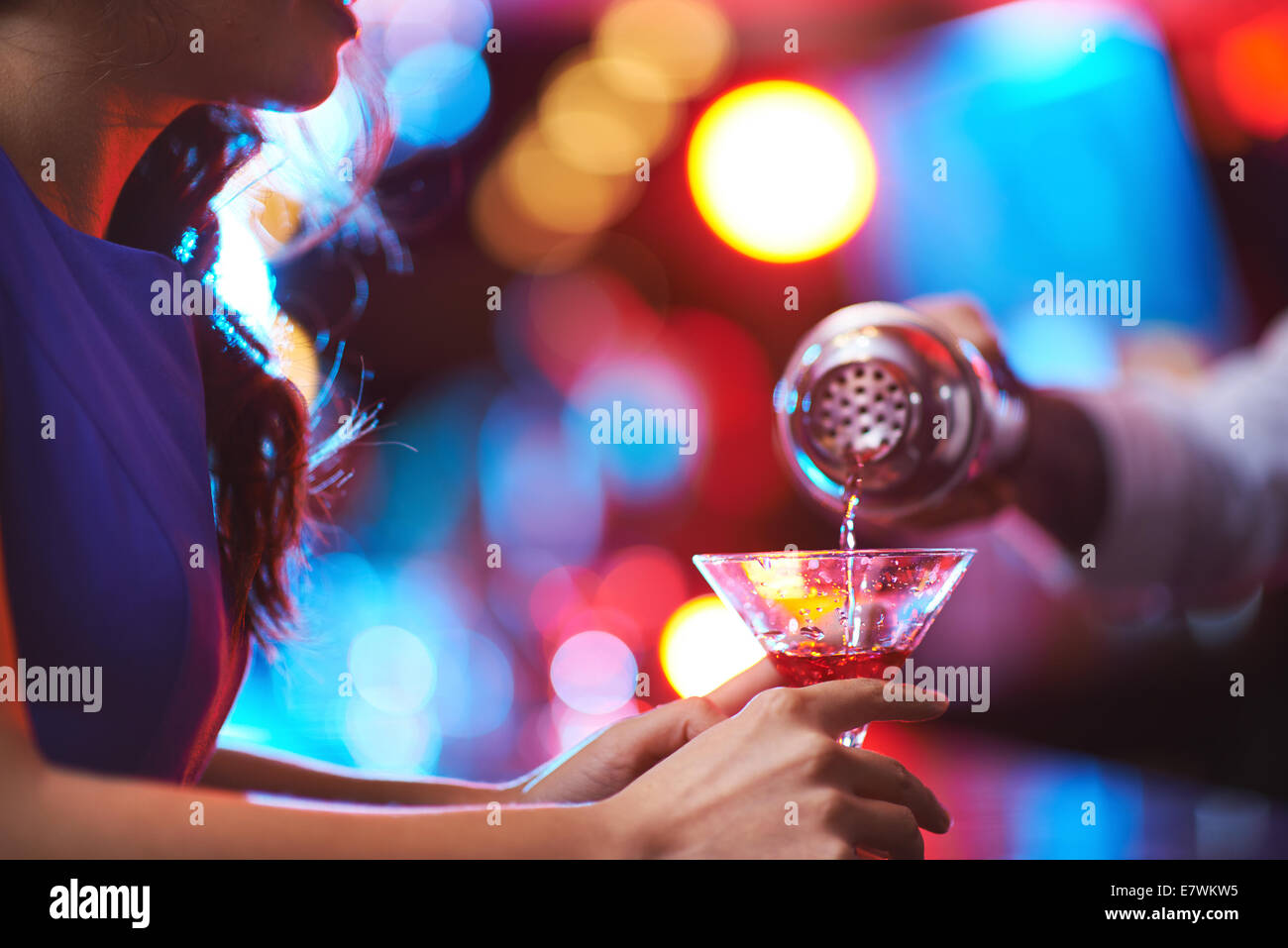 Woman with drink in hand club nightclub hi-res stock photography and ...