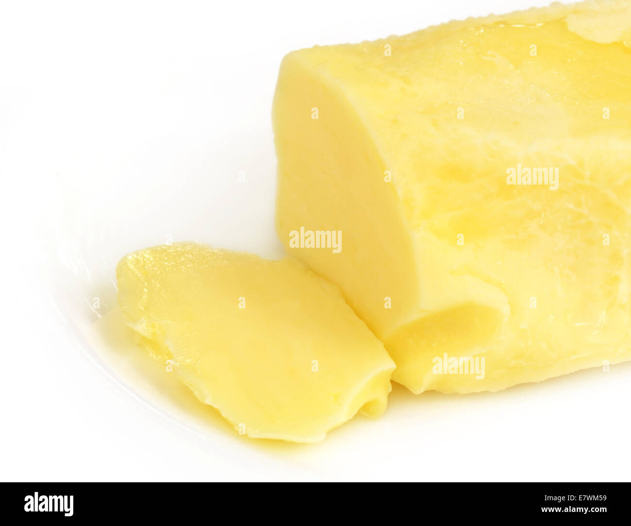 Sliced butter over white background Stock Photo - Alamy