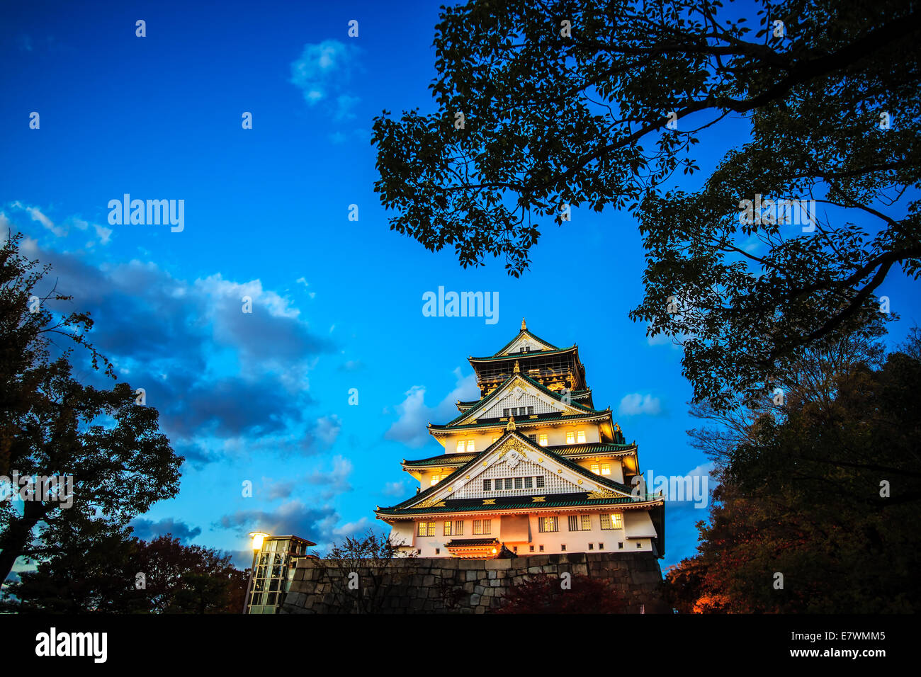 Osaka Castle in Osaka, Japan during a colorful pastel summer sunset ...