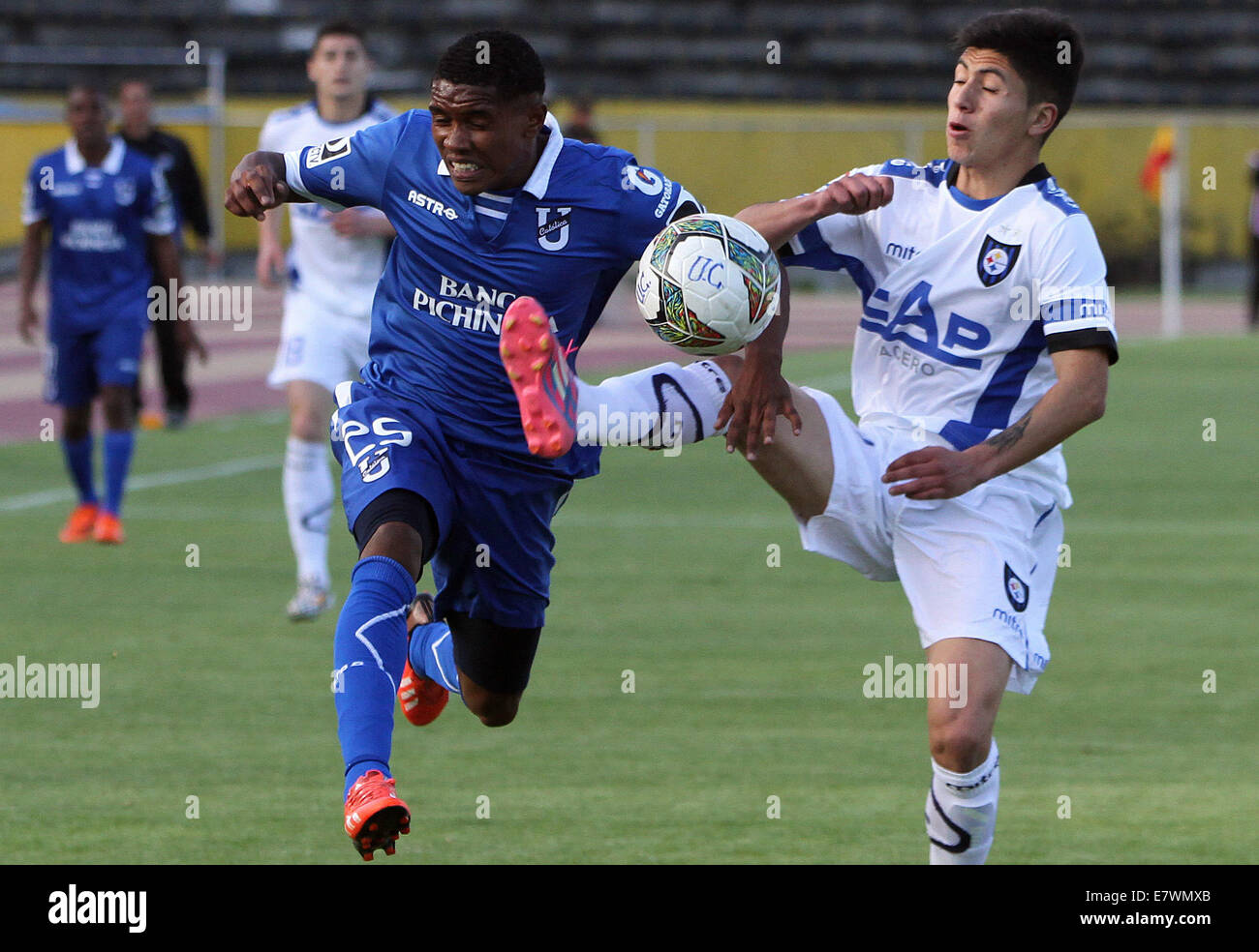Quito, Ecuador. 25th September, 2014. Bryan Sanchez (L) of Universidad ...