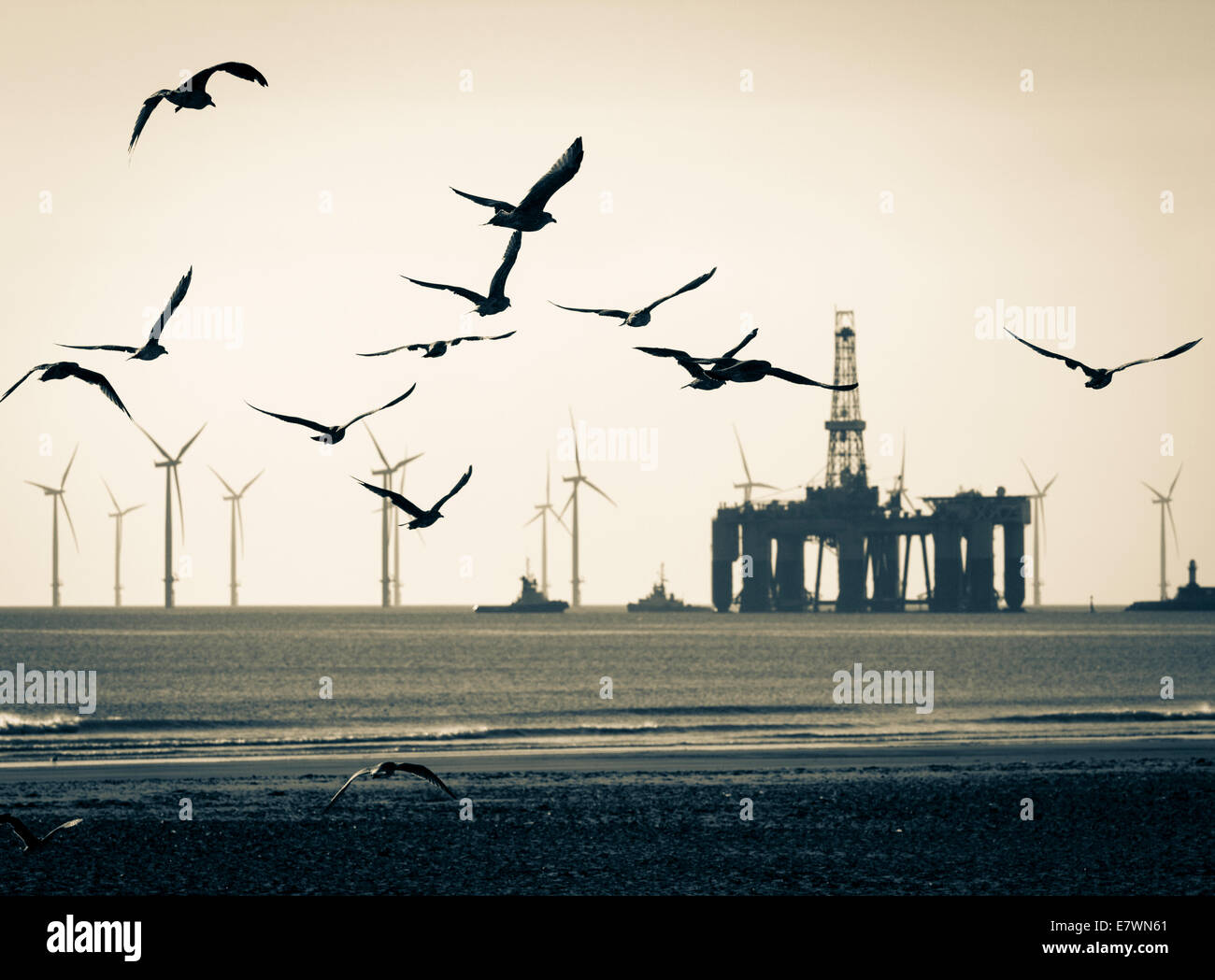 Oil, gas rig being towed past Teesside Offshore Wind farm at Redcar on ...