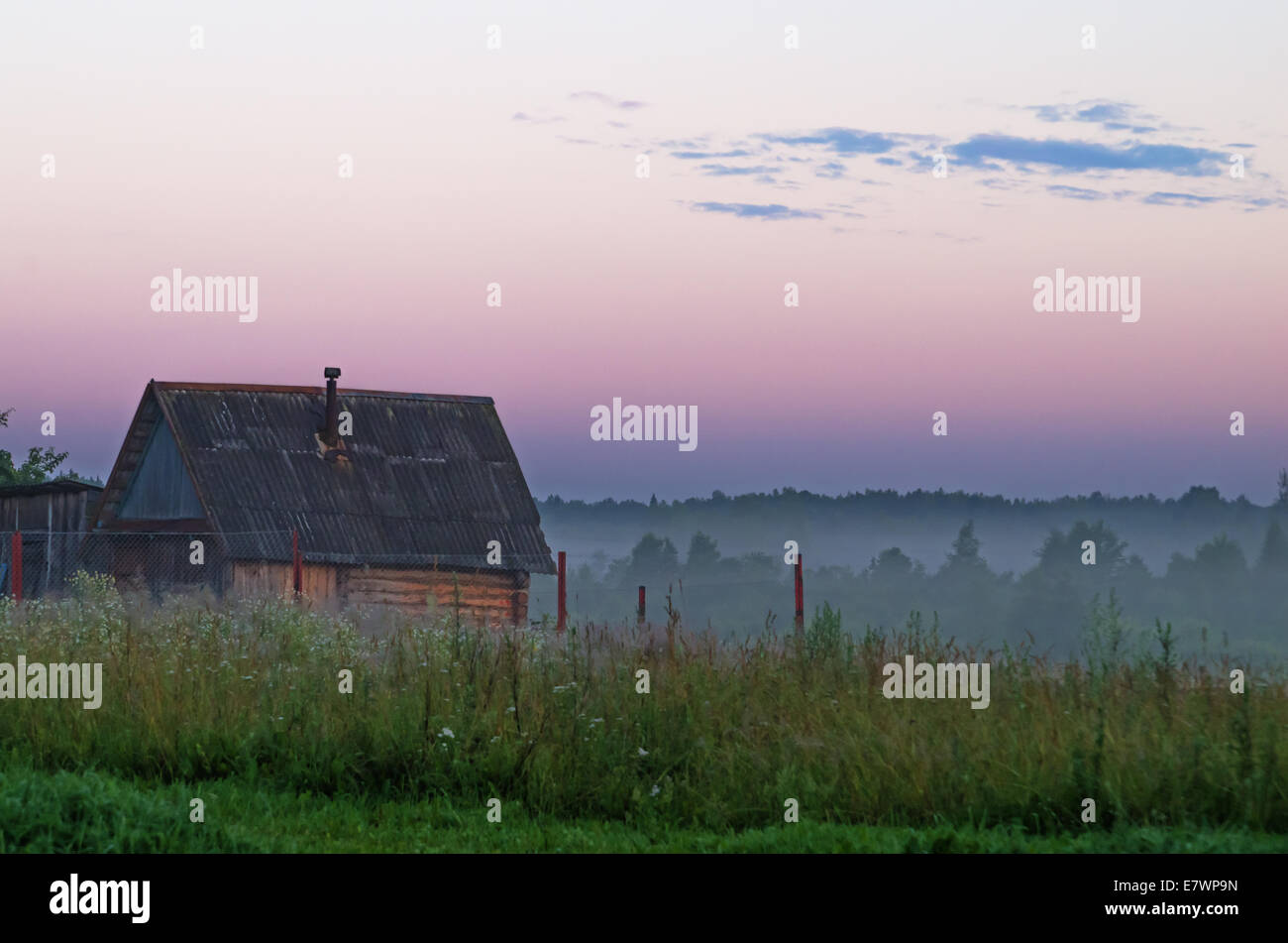 Sunrise over village Stock Photo - Alamy