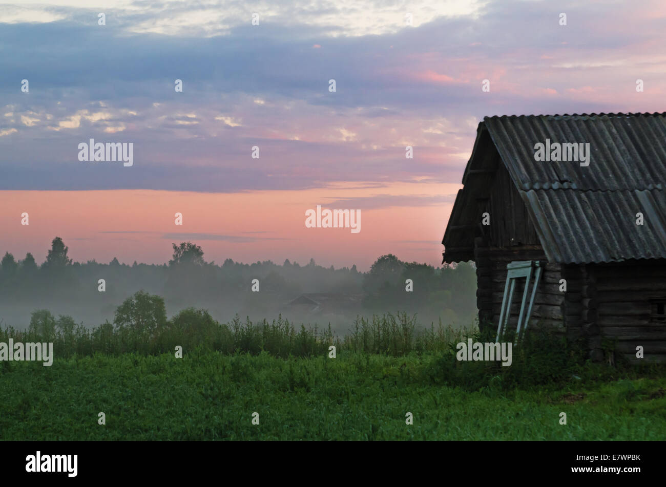Sunrise over village Stock Photo - Alamy