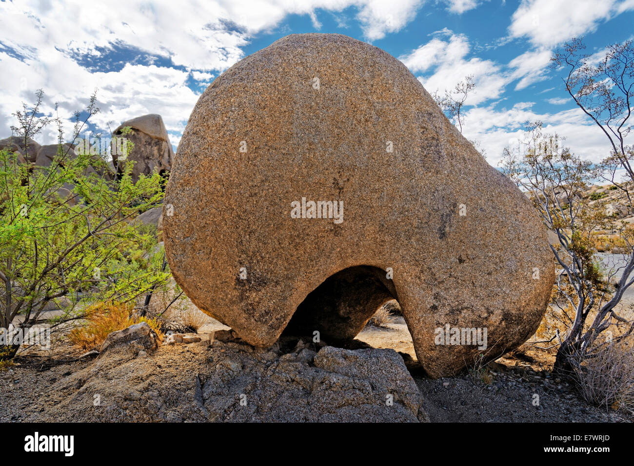 Round shaped huge granite rock with an erosed hole, Split Rocks, Joshua ...