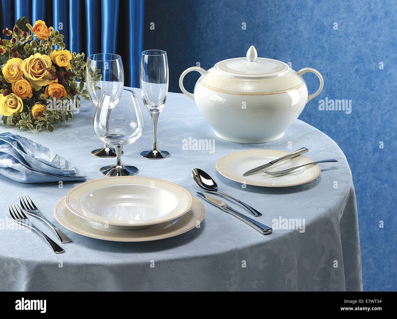 Dining table set blue and white Stock Photo - Alamy