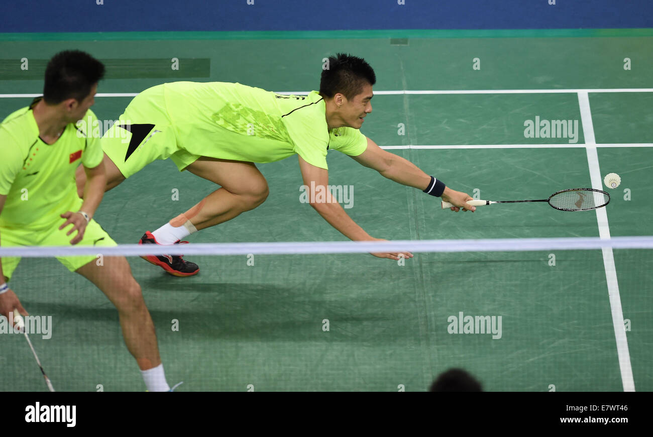 Incheon, South Korea. 25th Sep, 2014. Fu Haifeng (R) of China returns ...
