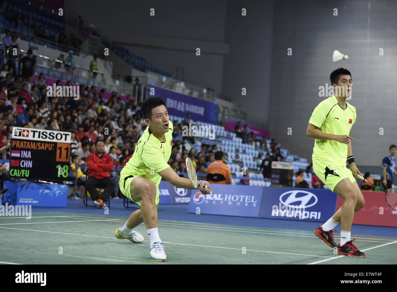Incheon, South Korea. 25th Sep, 2014. Cai Yun (L) of China returns the ...