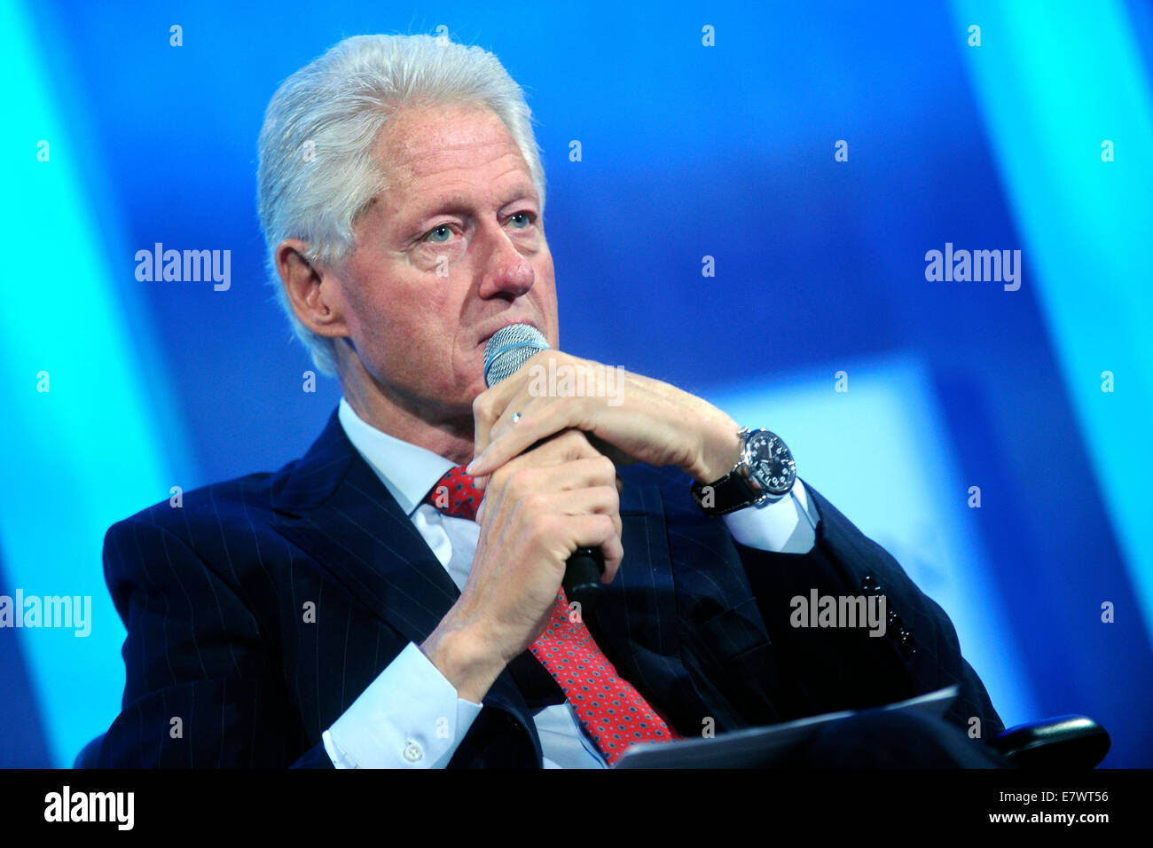 Former U.S. president Bill Clinton attending the Opening Plenary ...