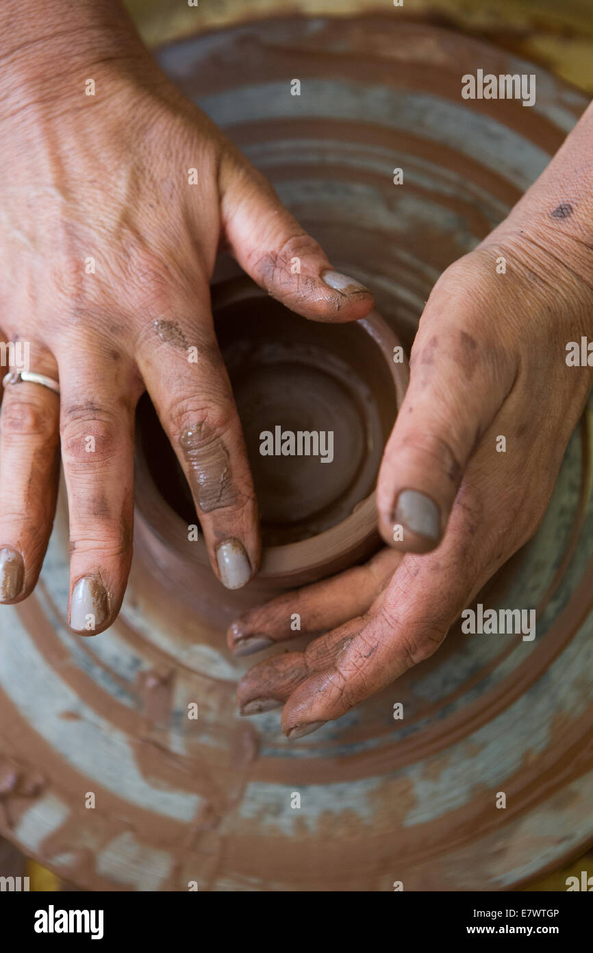 Hands throwing pottery hi-res stock photography and images - Alamy