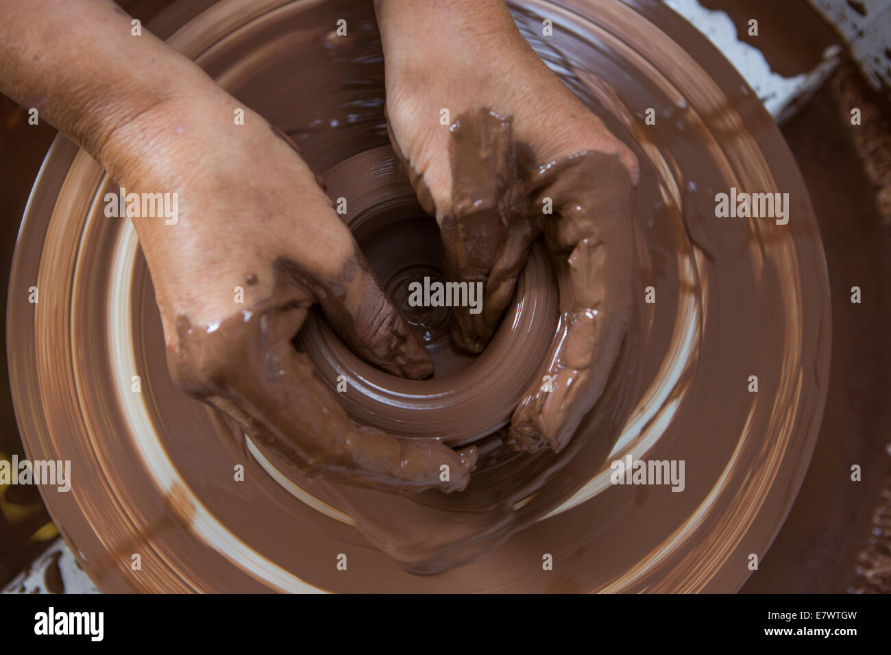 Hands throwing pottery hi-res stock photography and images - Alamy