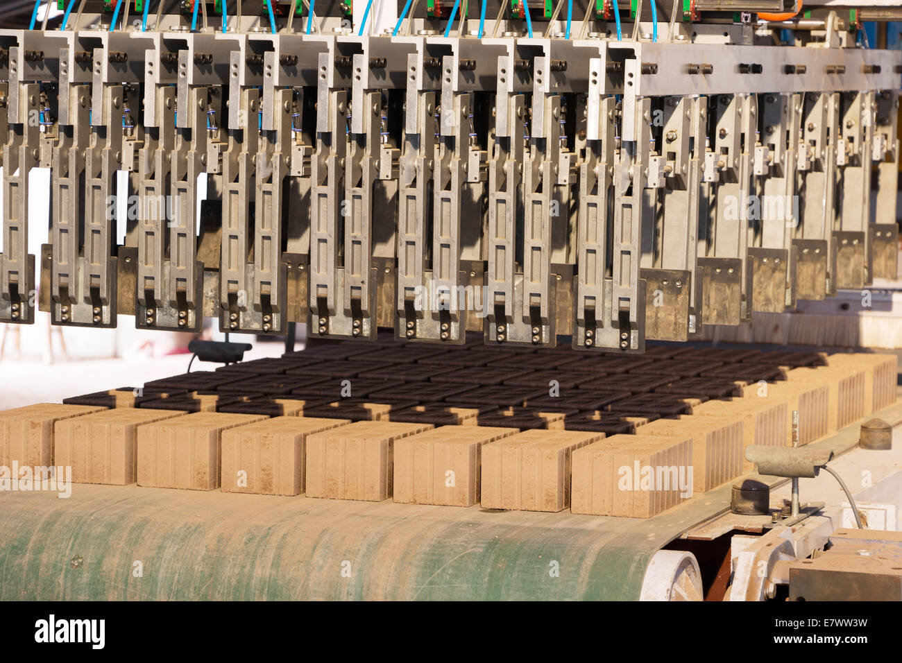 brick compression forming in factory Stock Photo - Alamy