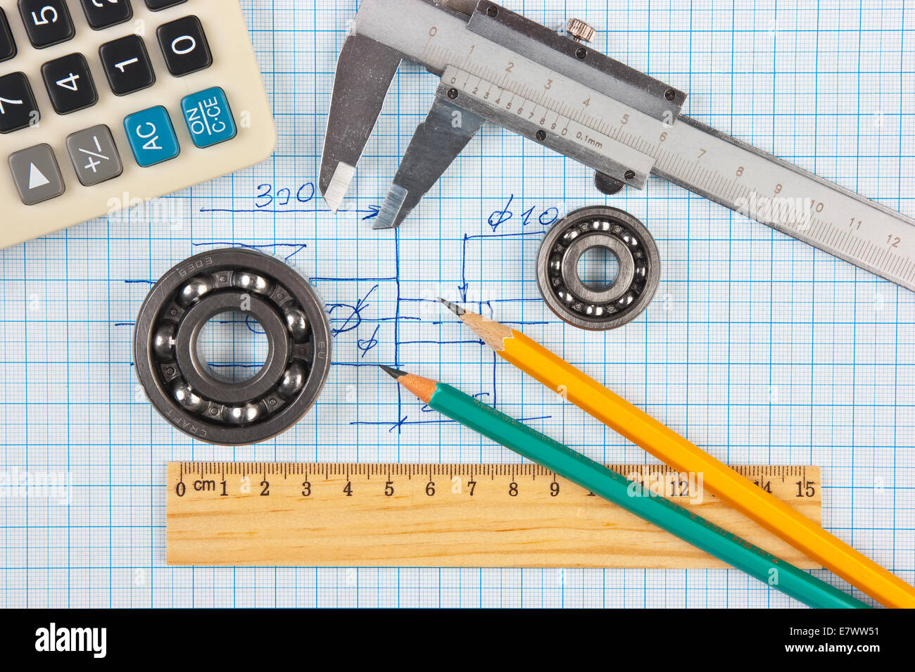 technical tools on a background of graph paper Stock Photo - Alamy