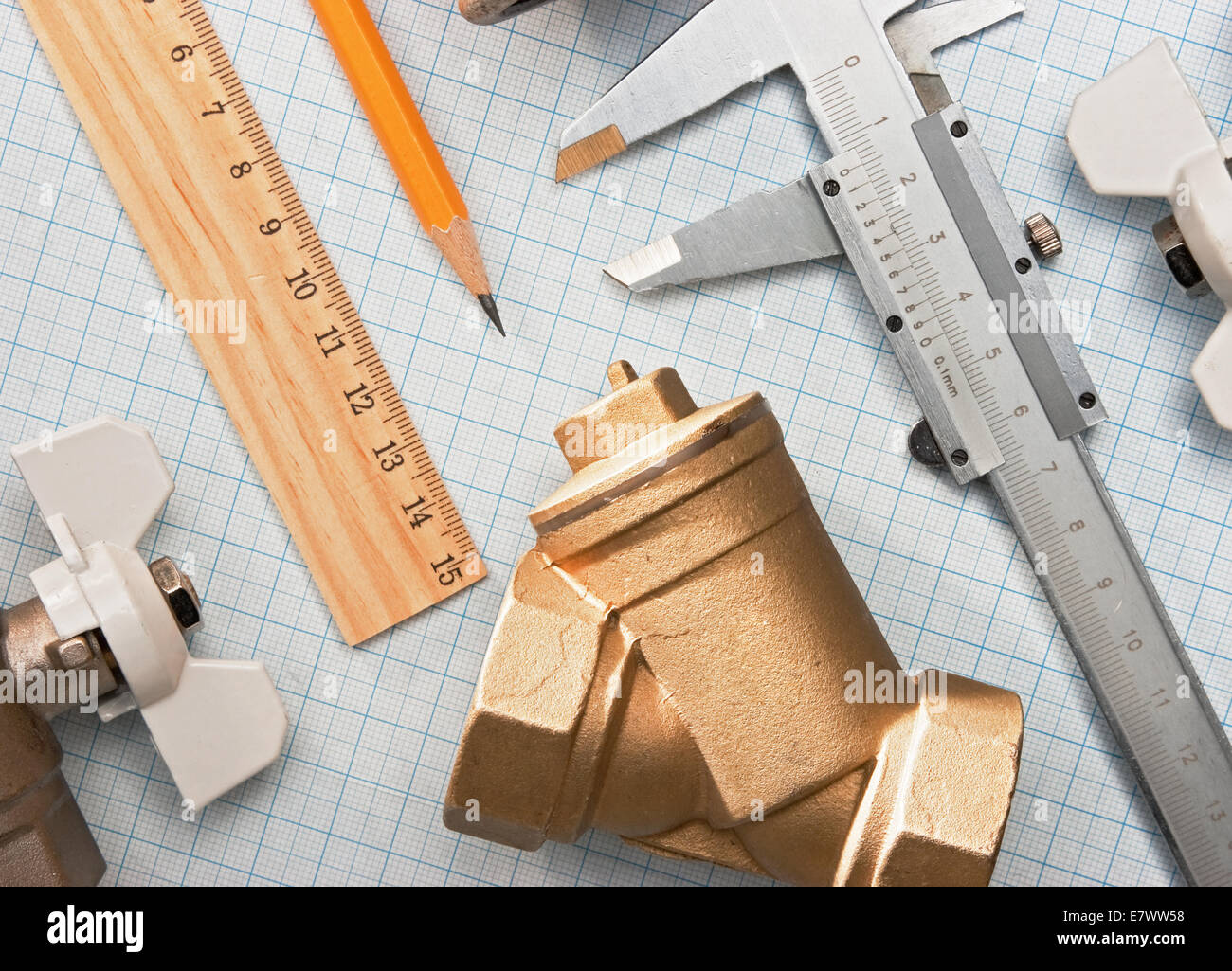 water inlet valve on a background of graph paper Stock Photo - Alamy