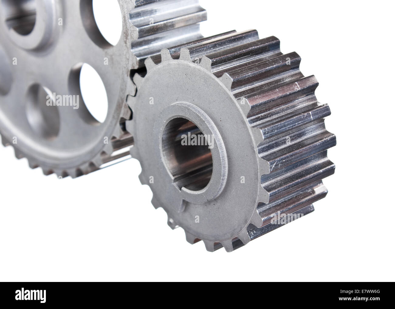 two gear coupled isolated on white background Stock Photo - Alamy