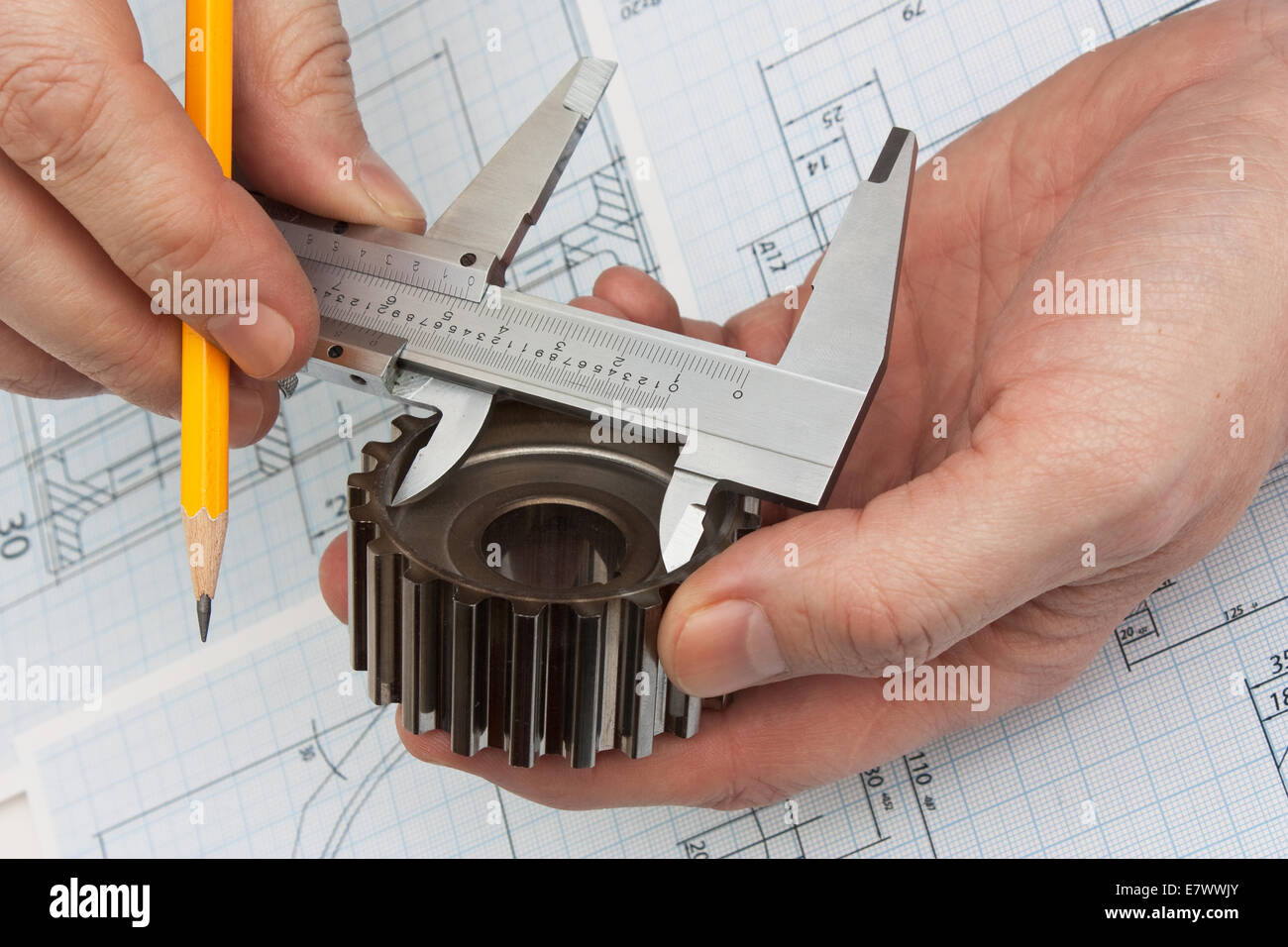 technical drawing and tools in hand Stock Photo - Alamy