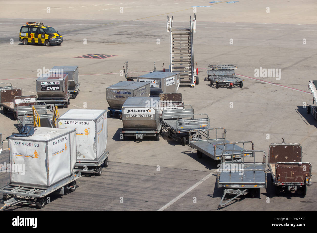 Cargo carts awaiting the arrival of a flight at Athens International ...
