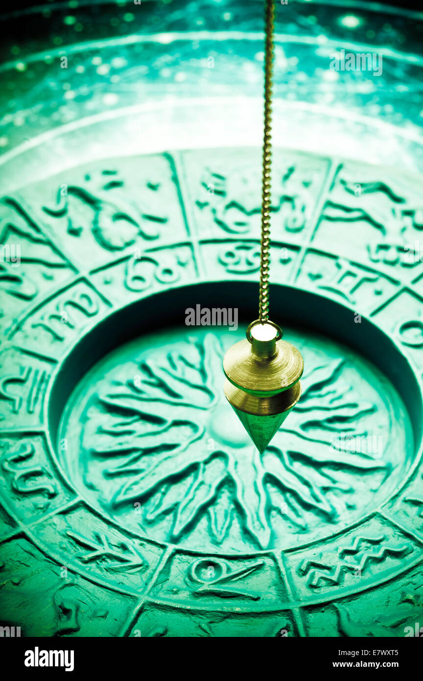 astrology and pendulum Stock Photo - Alamy