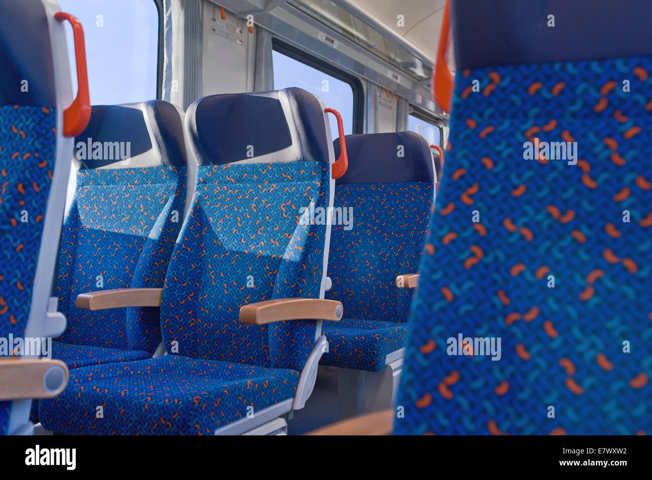 Interior of european economy class passenger train with empty seats ...